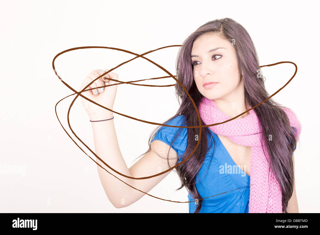 Beautiful woman drawing in the air Stock Photo - Alamy