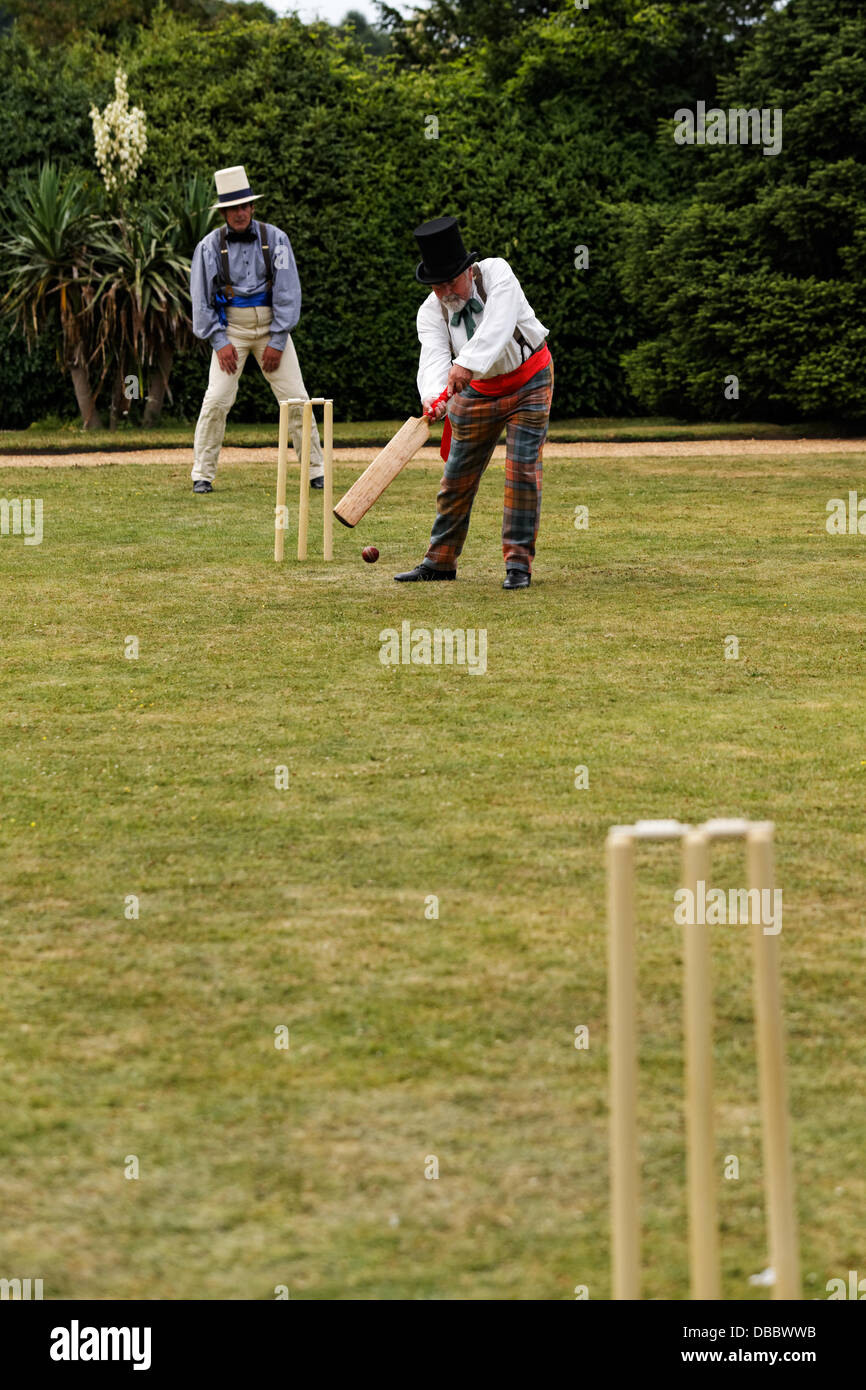 Victorian era recreation: cricket played by opposing teams of gentlemen ...