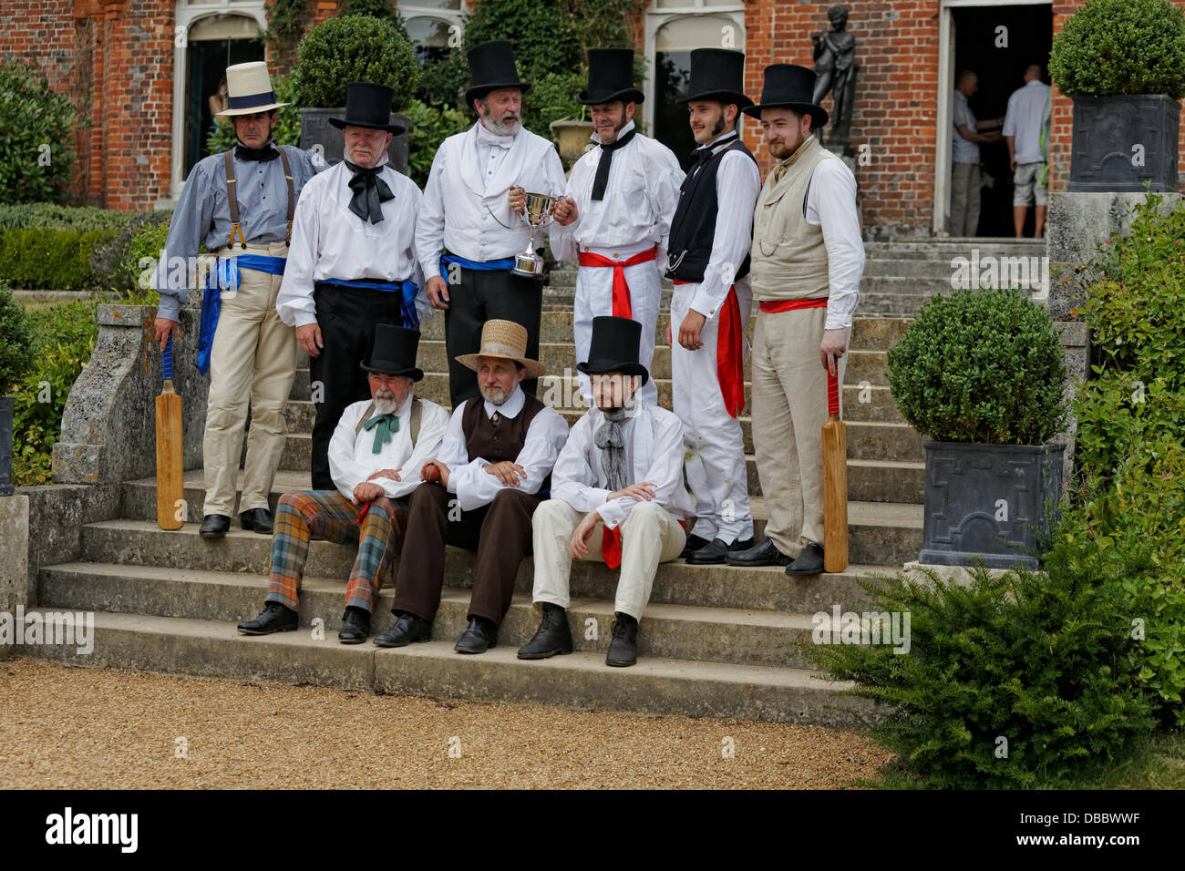 Victorian era recreation: cricket teams & captains with trophy pose for ...