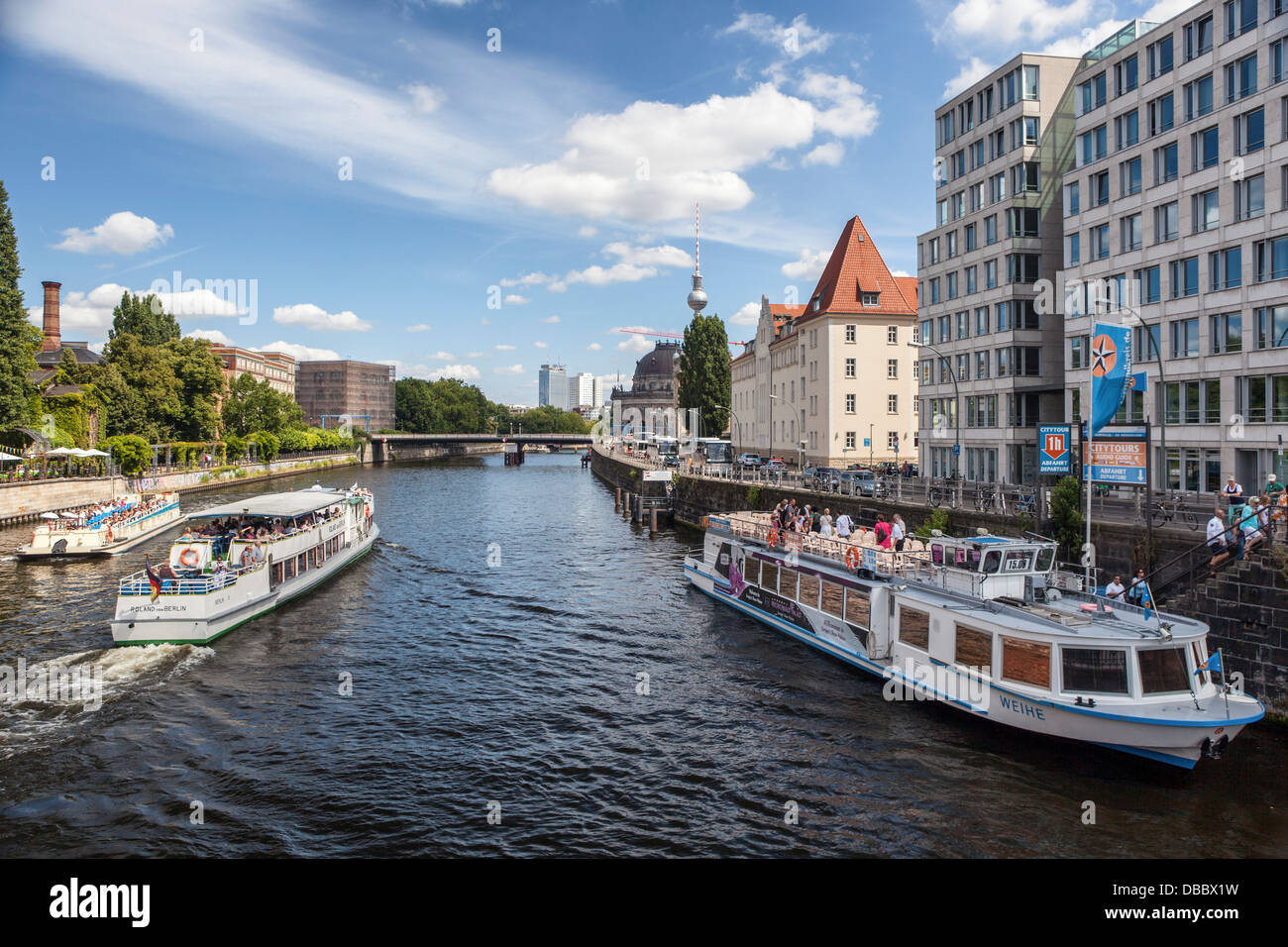 Landscape view of Berlin - river Spree, tourist boats, buildings ...