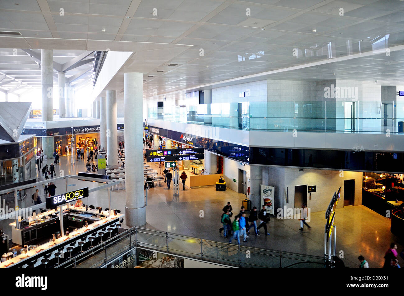 Elevated view inside the airside departures hall showing duty free ...