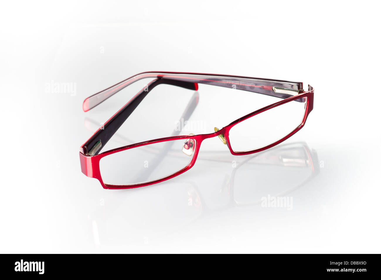 Red spectacles on isolated white background Stock Photo - Alamy
