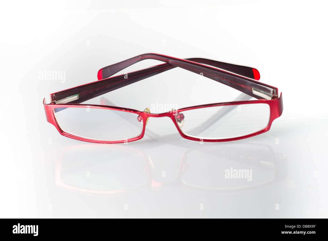 Red spectacles on isolated white background Stock Photo - Alamy