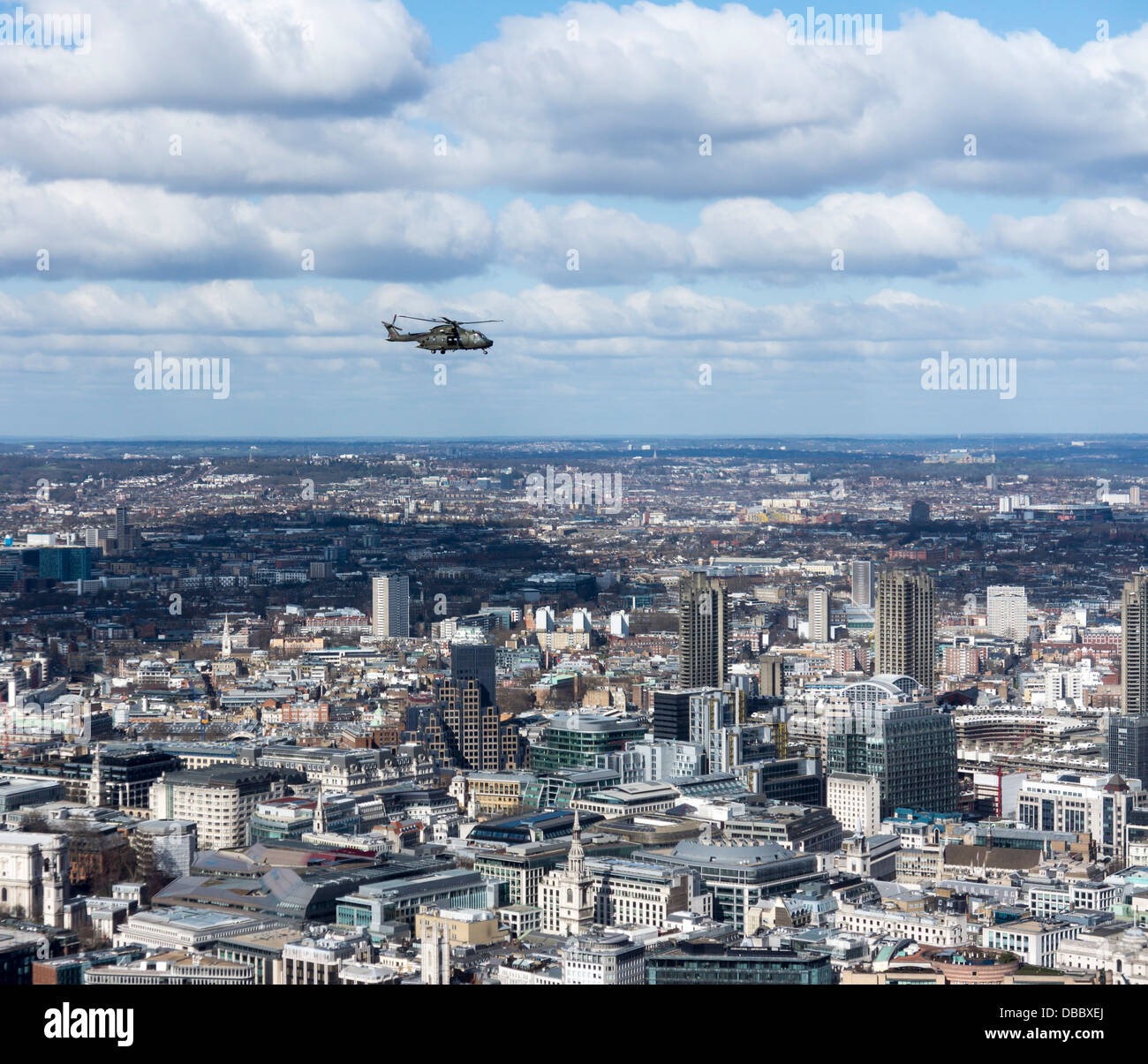 Military helicopter flying over central London, viewed from the ...