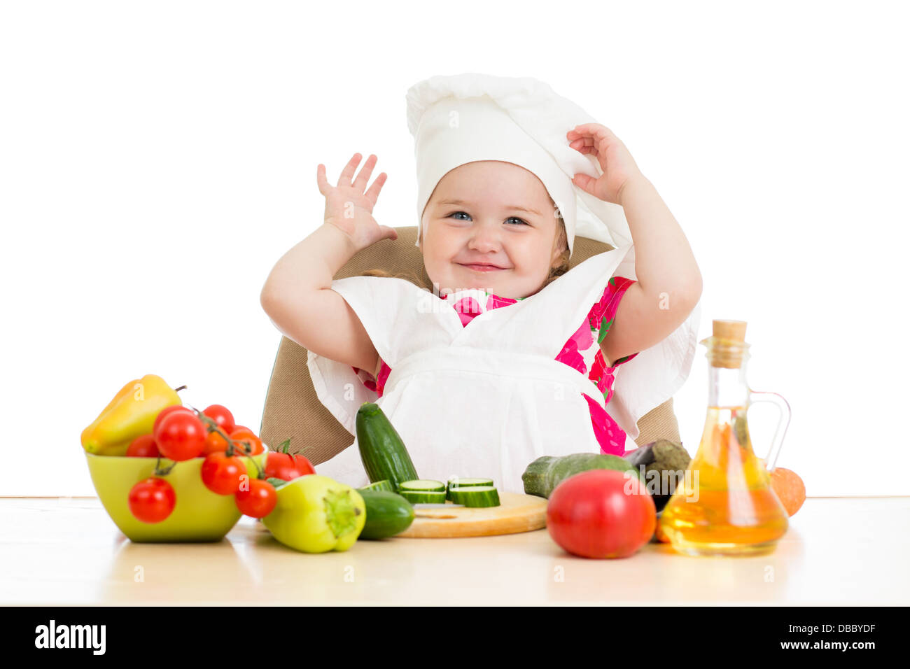 Chef child with healthy food Stock Photo - Alamy