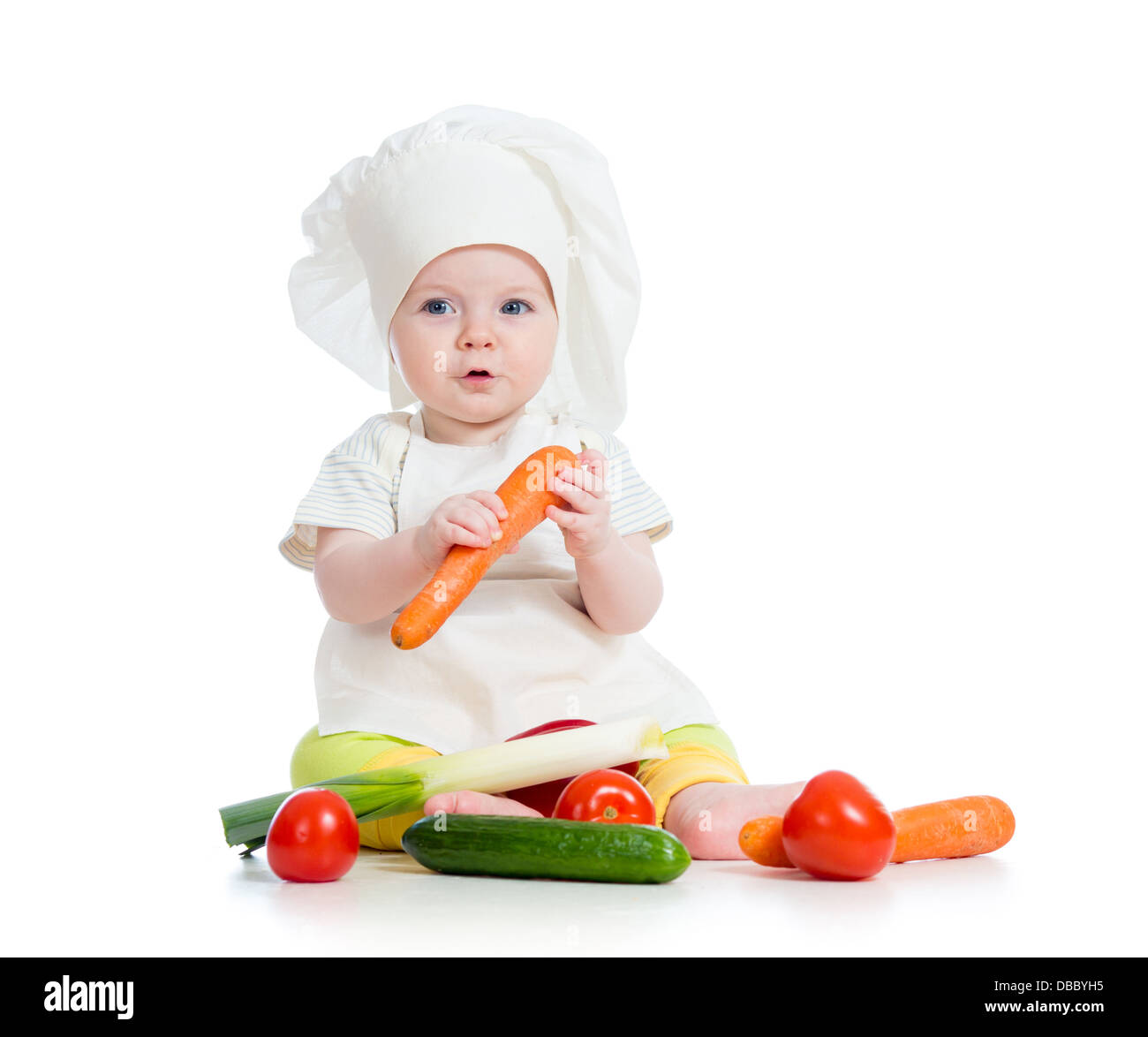 cook baby girl eating healthy food isolated on white Stock Photo - Alamy