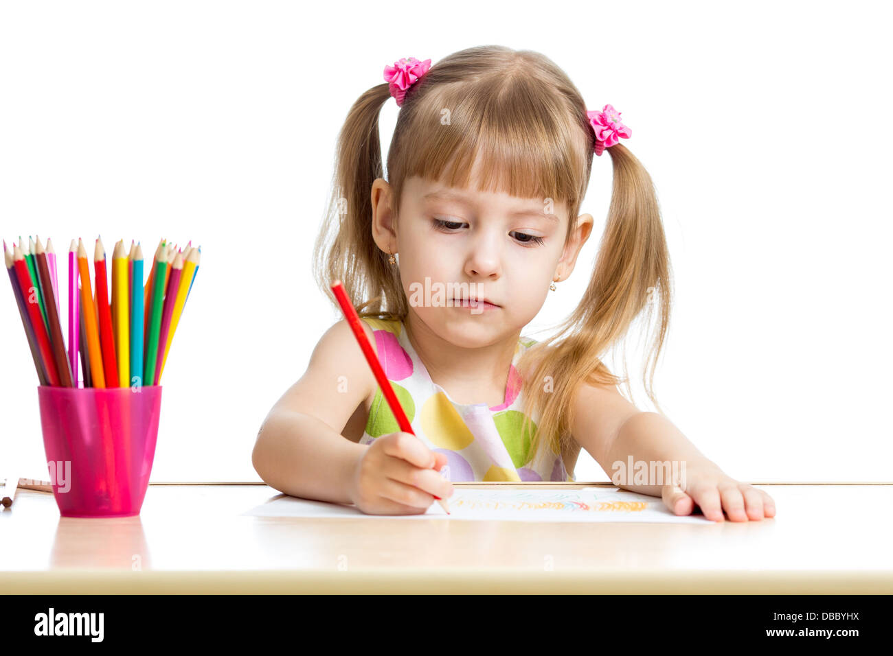 cute child drawing with colorful pencils Stock Photo - Alamy