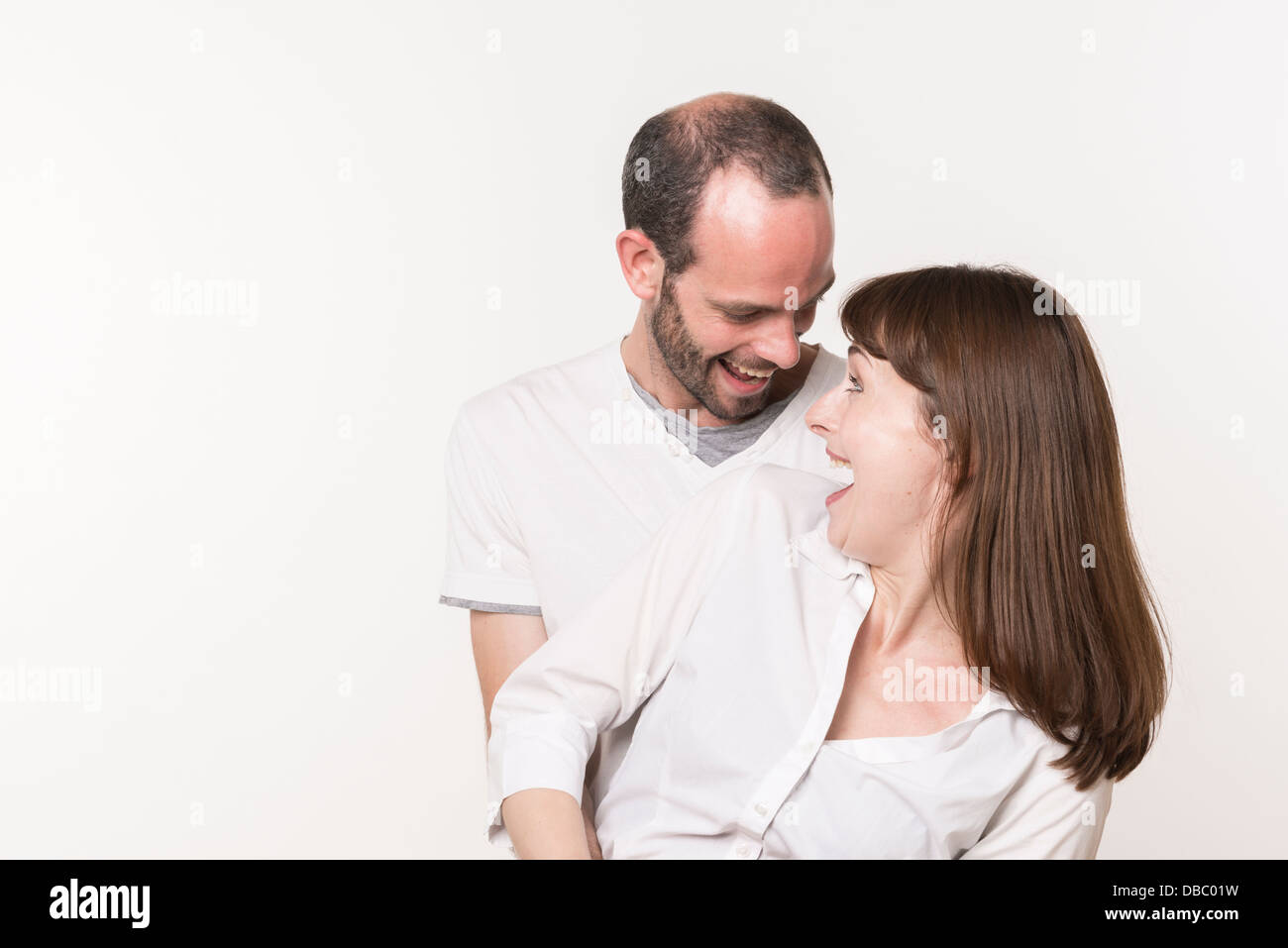 Man hugging woman from behind hi-res stock photography and images - Alamy