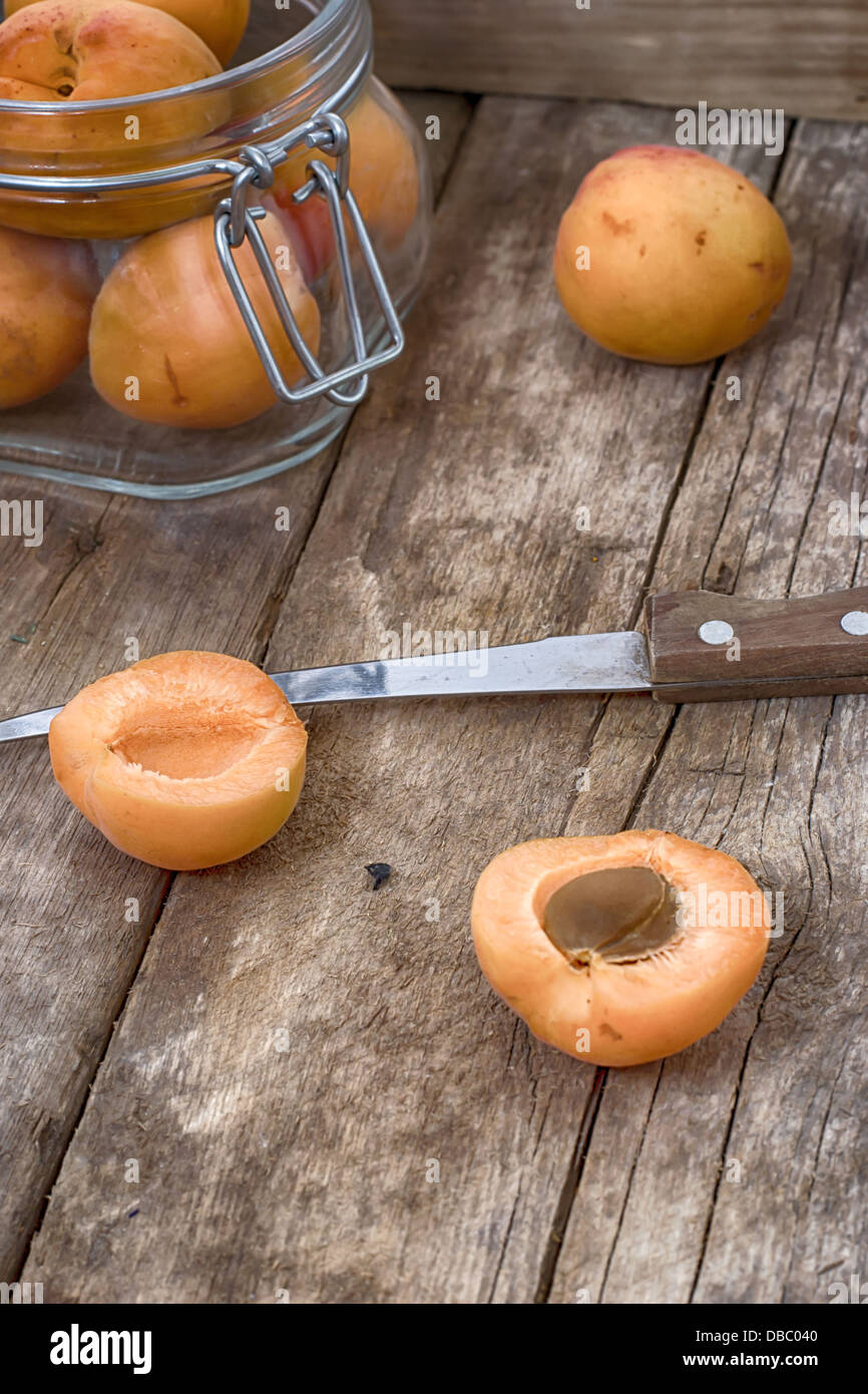 Ripe apricot on a wooden background Stock Photo - Alamy