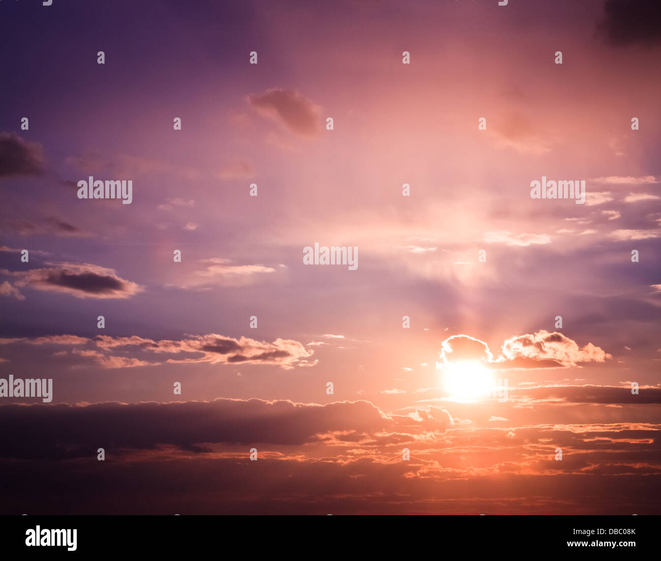 The Sun Shining Over Low Cloud Stock Photo - Alamy