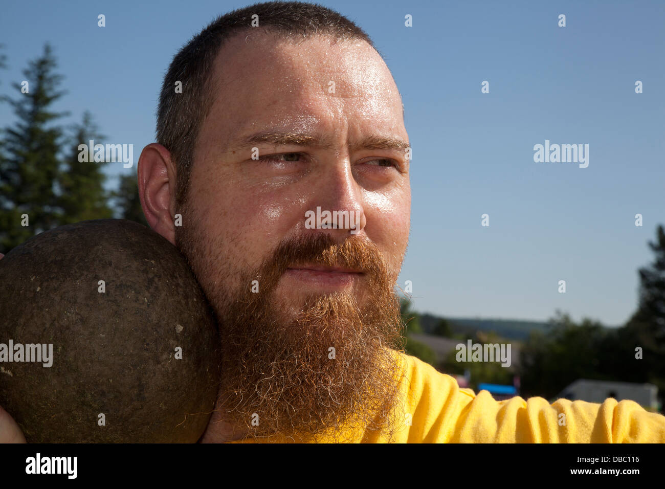 Putting the shot in Tomintoul, Scotland, UK. 20th July, 2013. Aaron ...