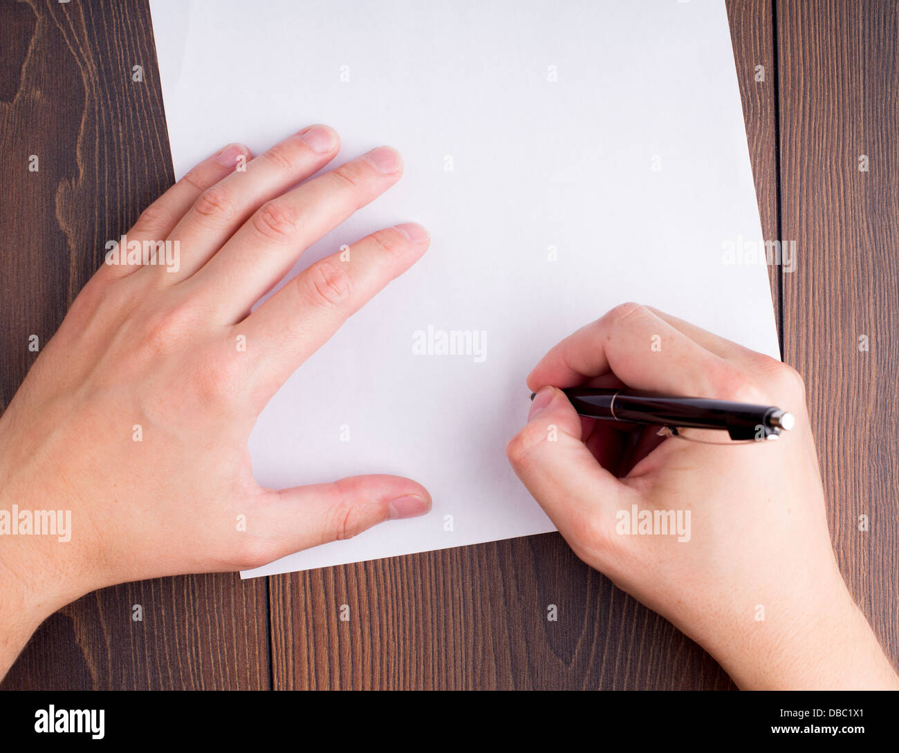 Someone signing contract Stock Photo - Alamy