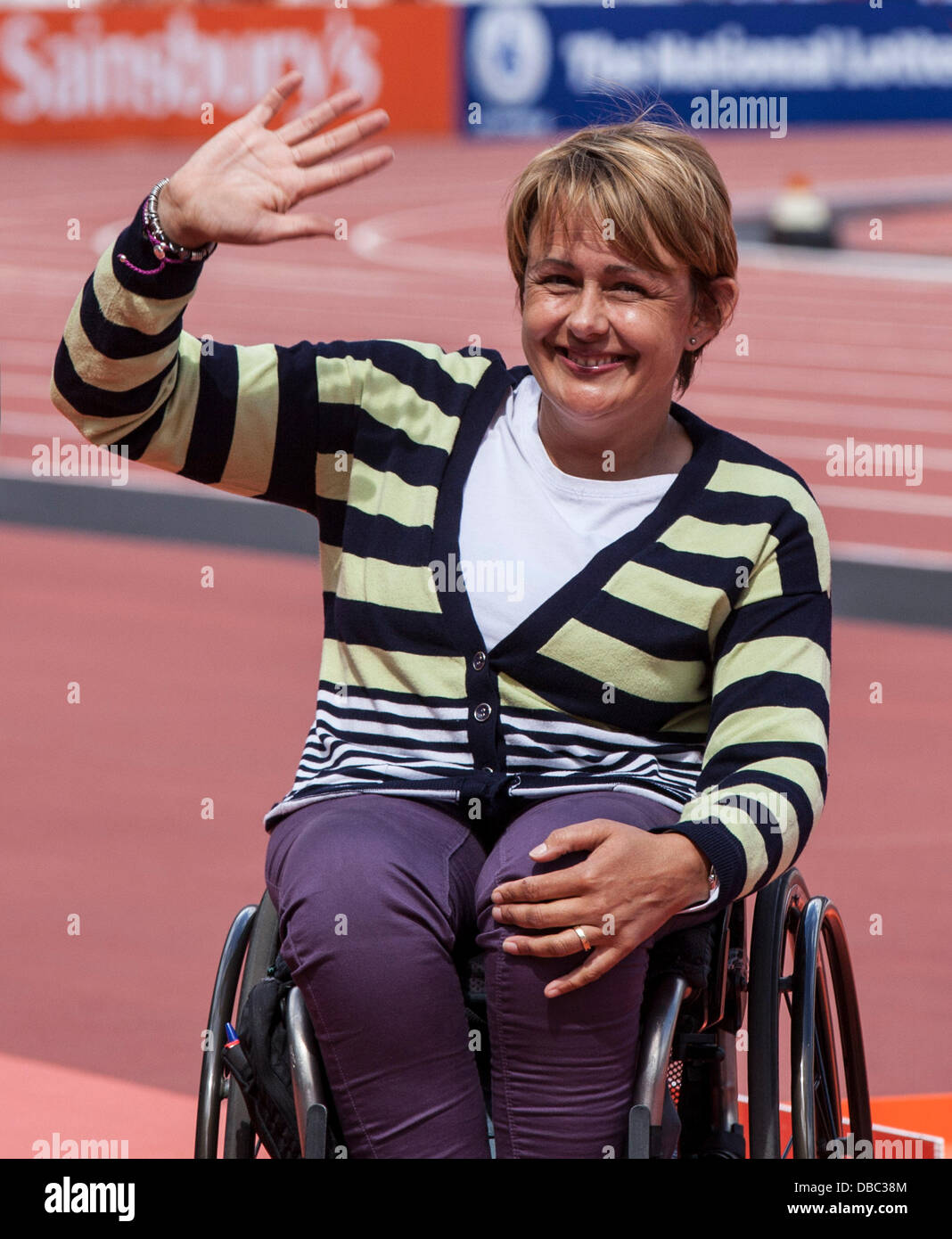 London, UK. 28th July, 2013. Tanni Grey-Thompson waves to crowds at the ...