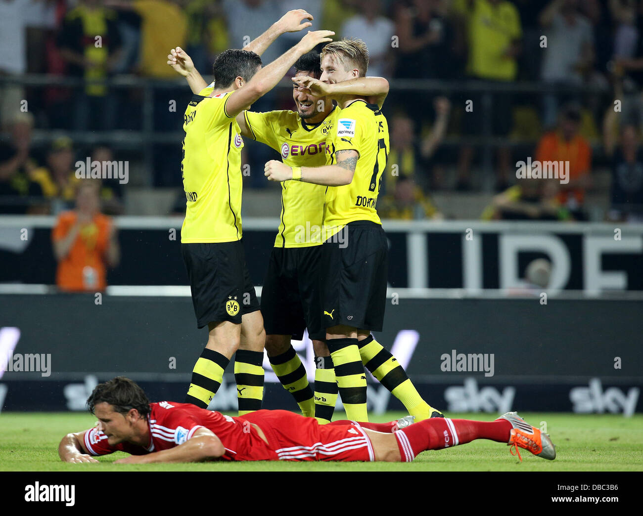 Dortmund's Robert Lewandowski (L-R), Ilkay Gundogan and Marco Reus ...