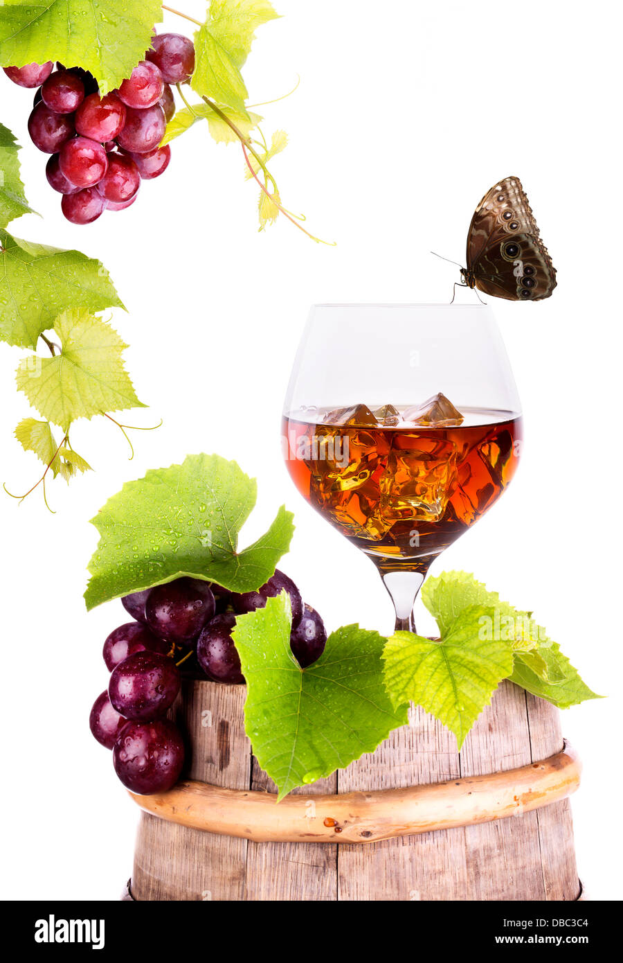 Cognac or brandy on a wooden vintage barrel with white background Stock ...