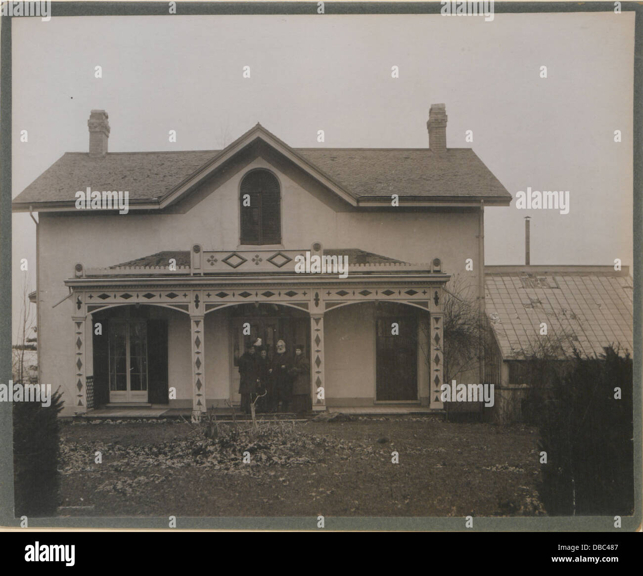 A photograph showing Dr. Alexander Graham Bell and a group of people at ...