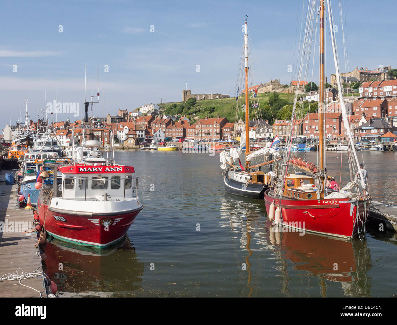 Whitby Yorkshire UK looking over Inner Harbour to St. Marys Parish ...