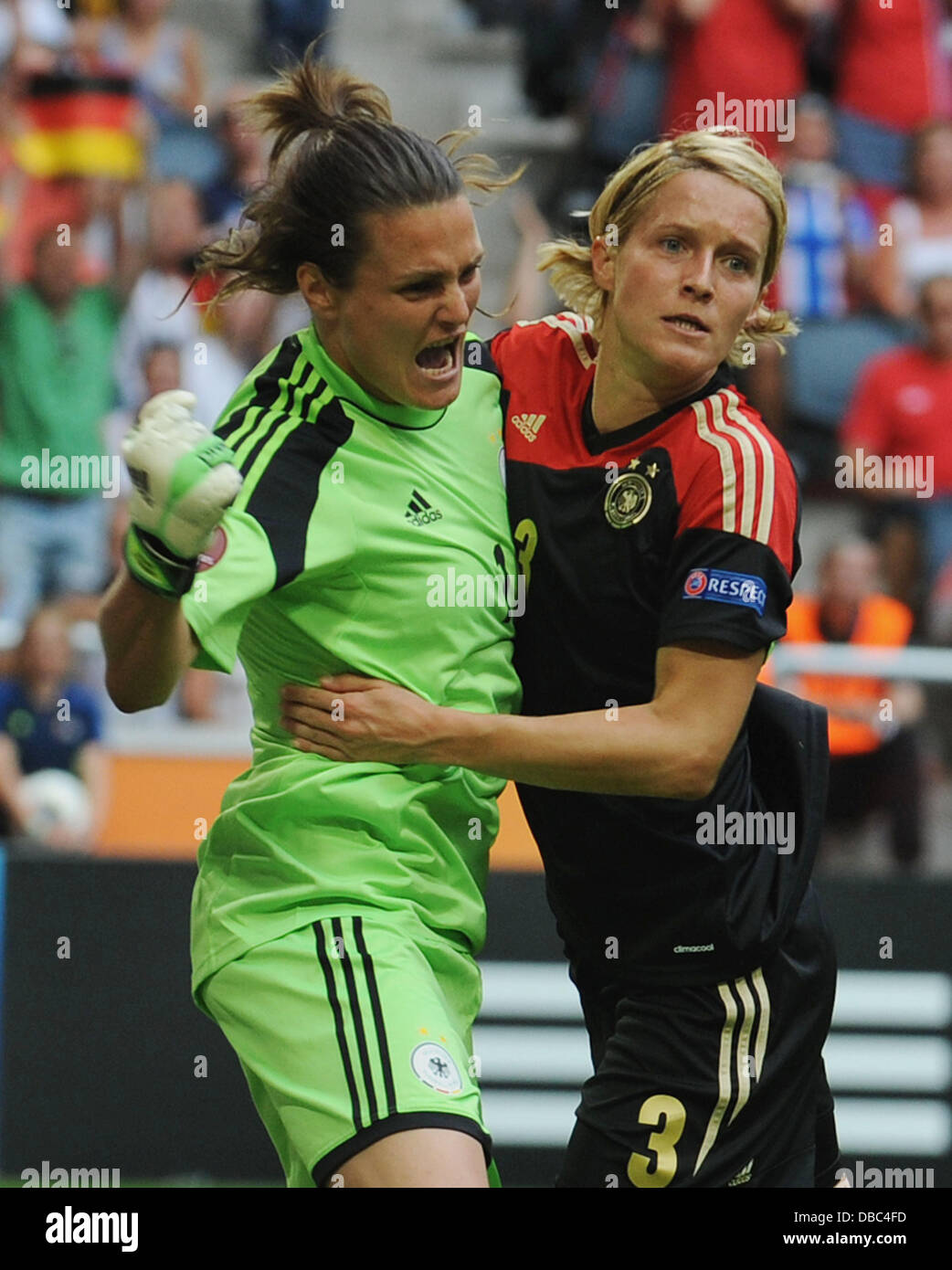 Goalkeeper Nadine Angerer (l) and Saskia Bartusiak of Germany react ...