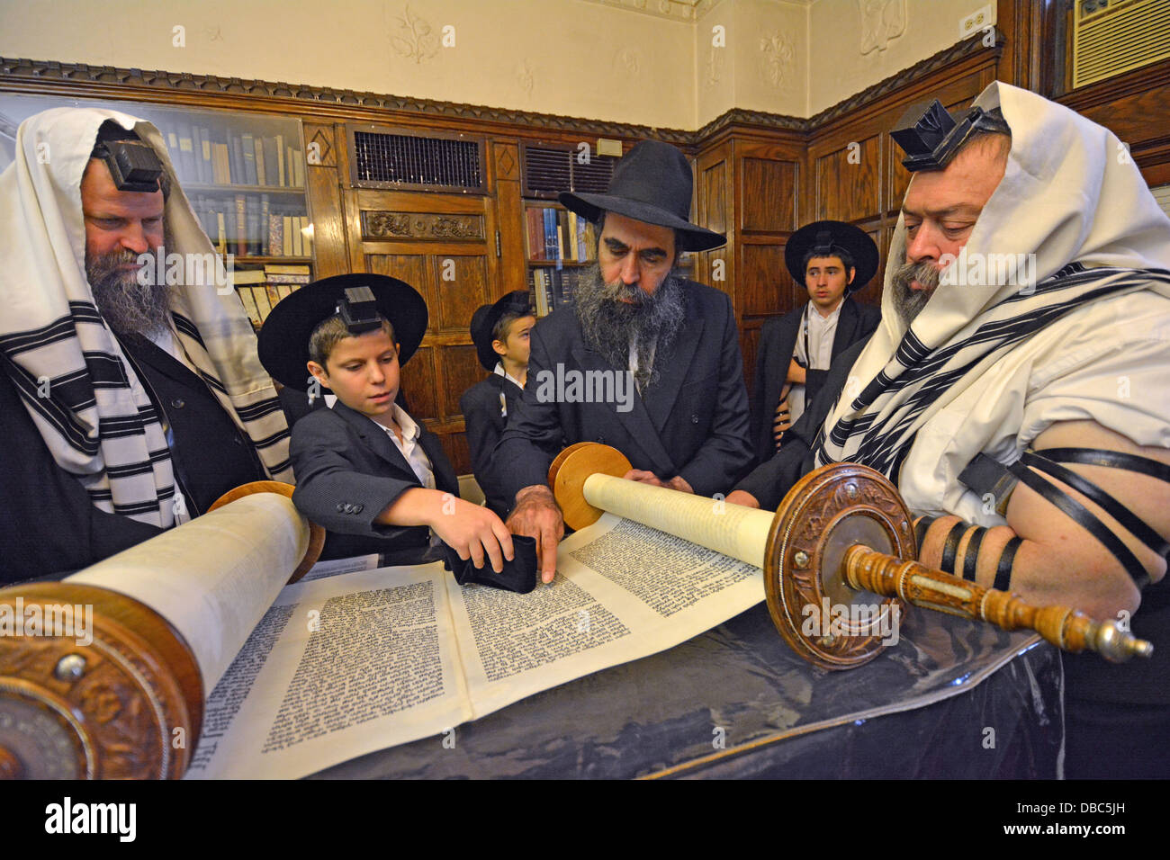 Religious Jews pray in the Rebbe's study at Lubavitch Headquarters in ...