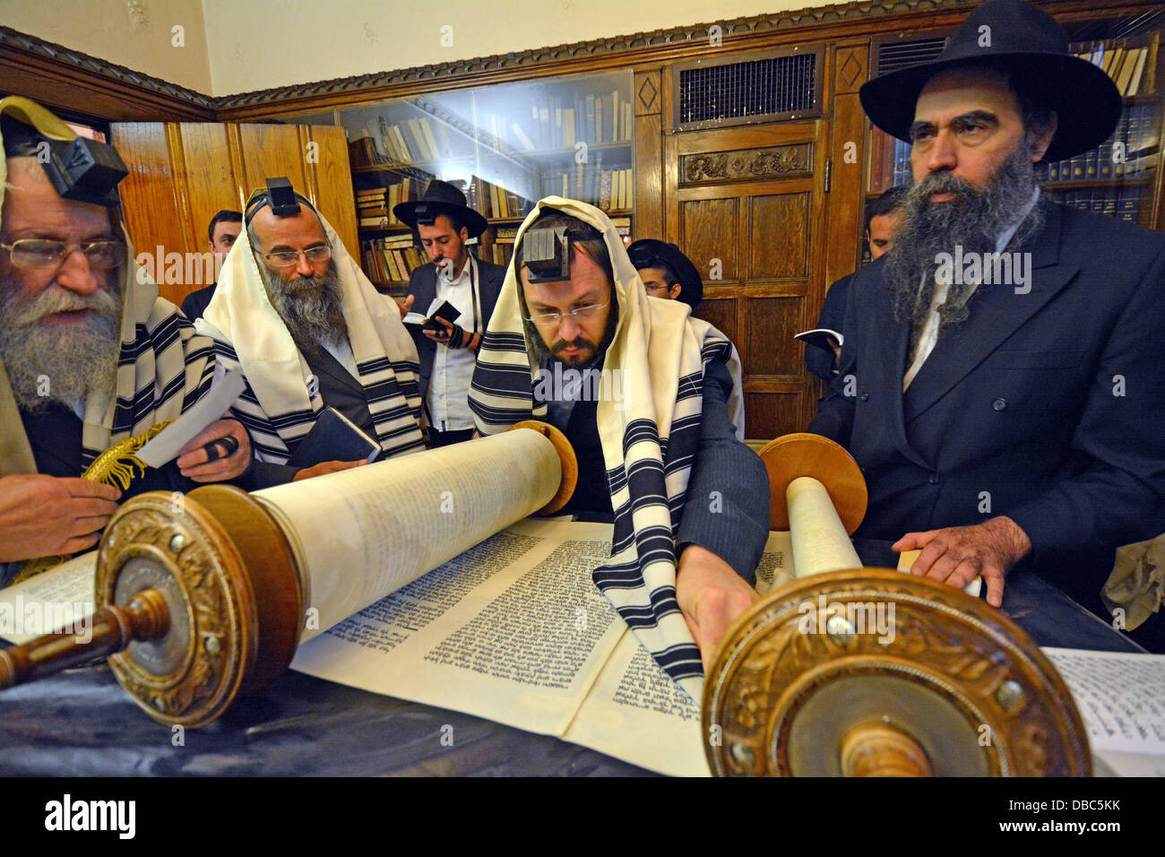 Religious Jews pray in the Rebbe's study at Lubavitch Headquarters in ...