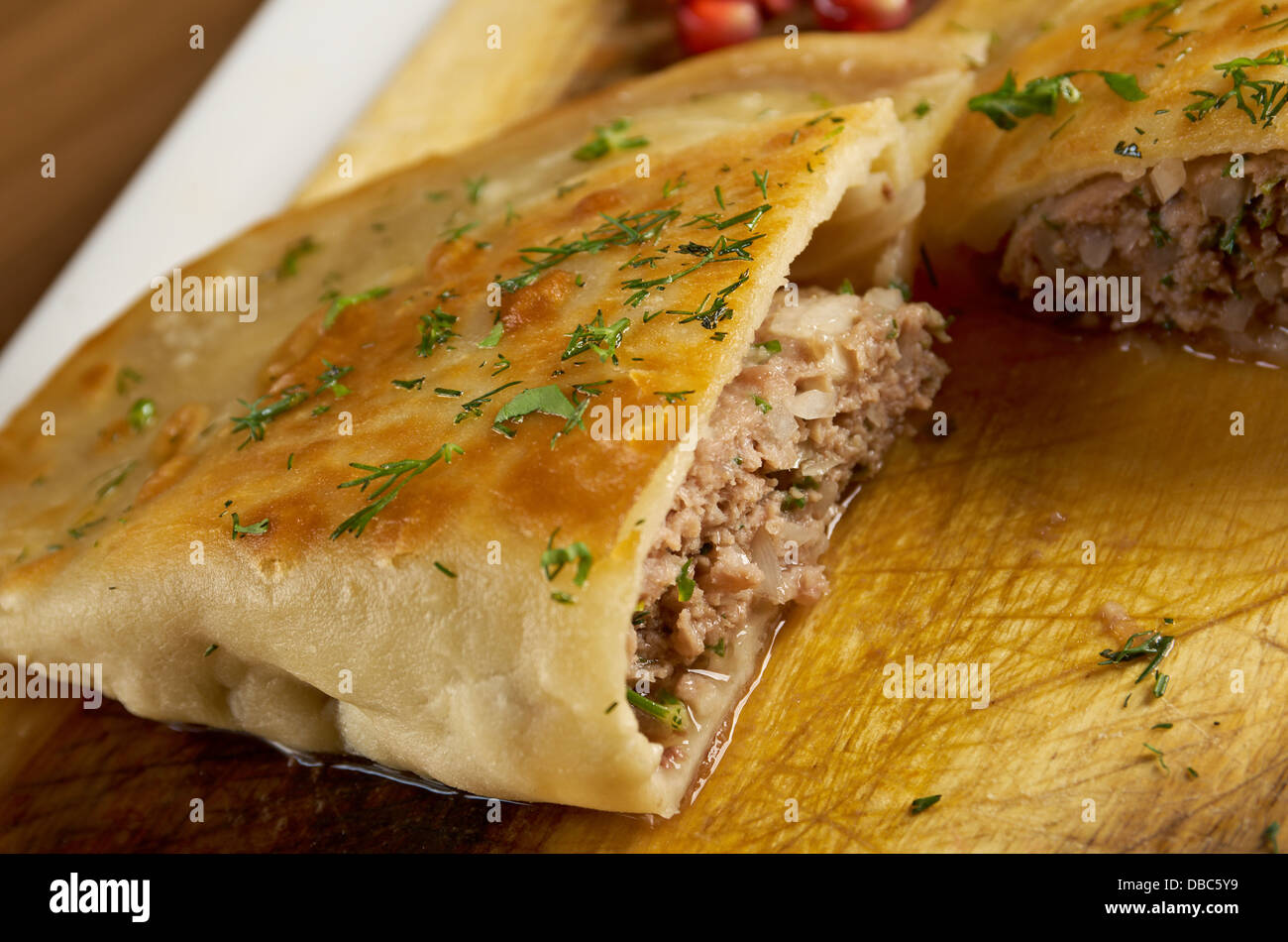 Qutab- baked Chebureki traditional georgian meat pastry.meat in a pitta ...