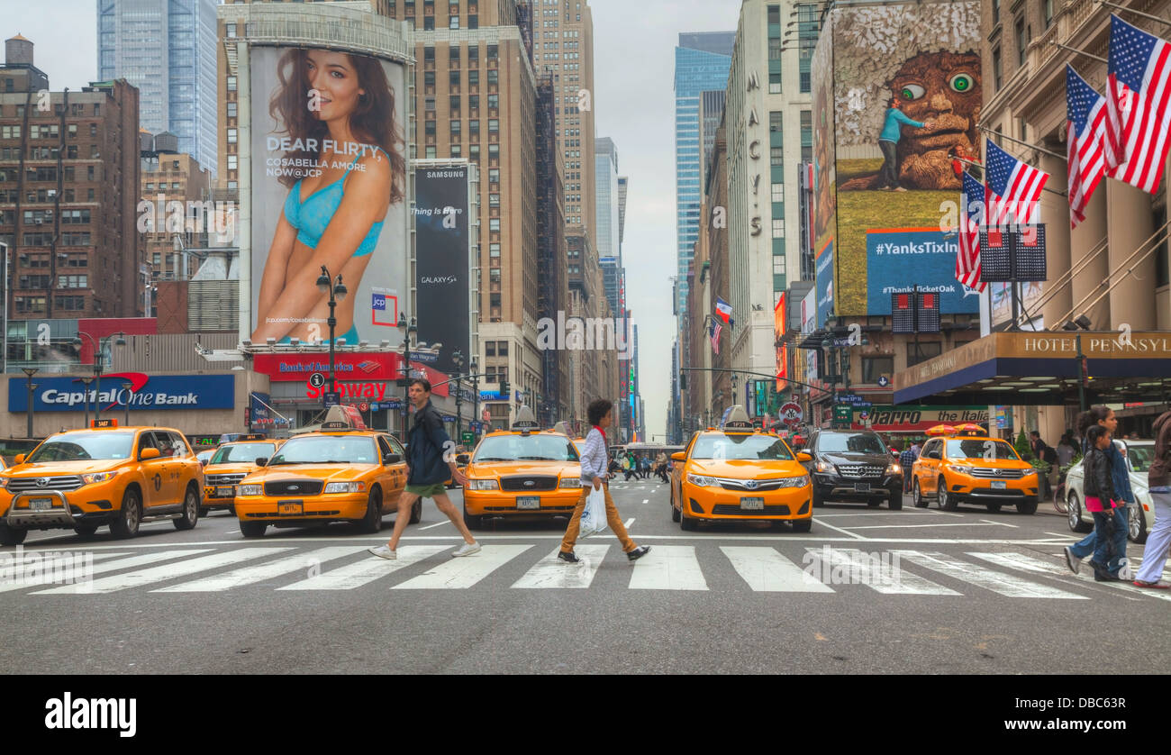 Yellow taxis at the street in New York. Yellow cars serve as taxis in ...