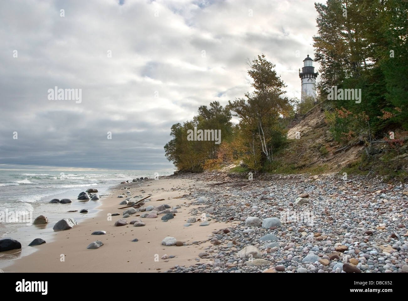 The Au Sable Point Lighthouse Tower Seen Above A Hill At Pictured Rocks ...
