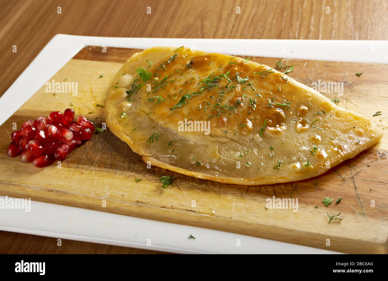 Qutab- baked Chebureki traditional georgian meat pastry.meat in a pitta ...