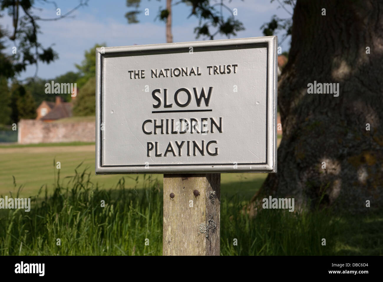 A National Trust sign "Slow Children Playing" in Bradenham ...