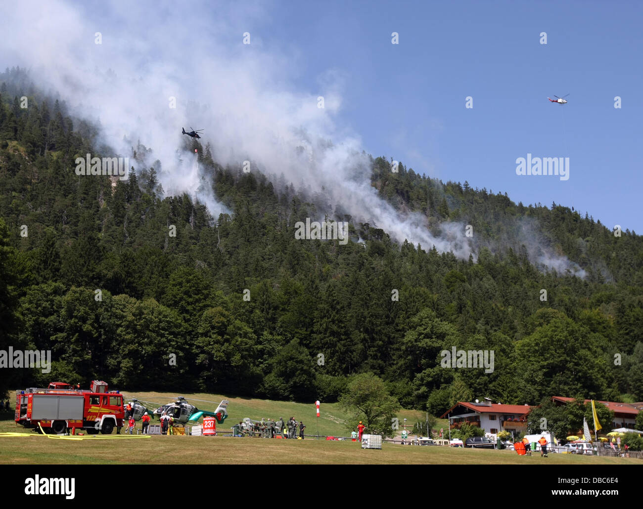 A forest fire above the Thum lake is visible near Bad Reichenhall ...