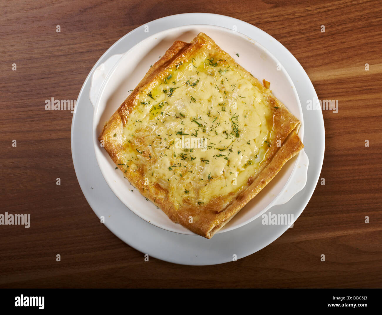 Qutab - baked lavash cheese pie .georgian bread and cheese suluguni ...