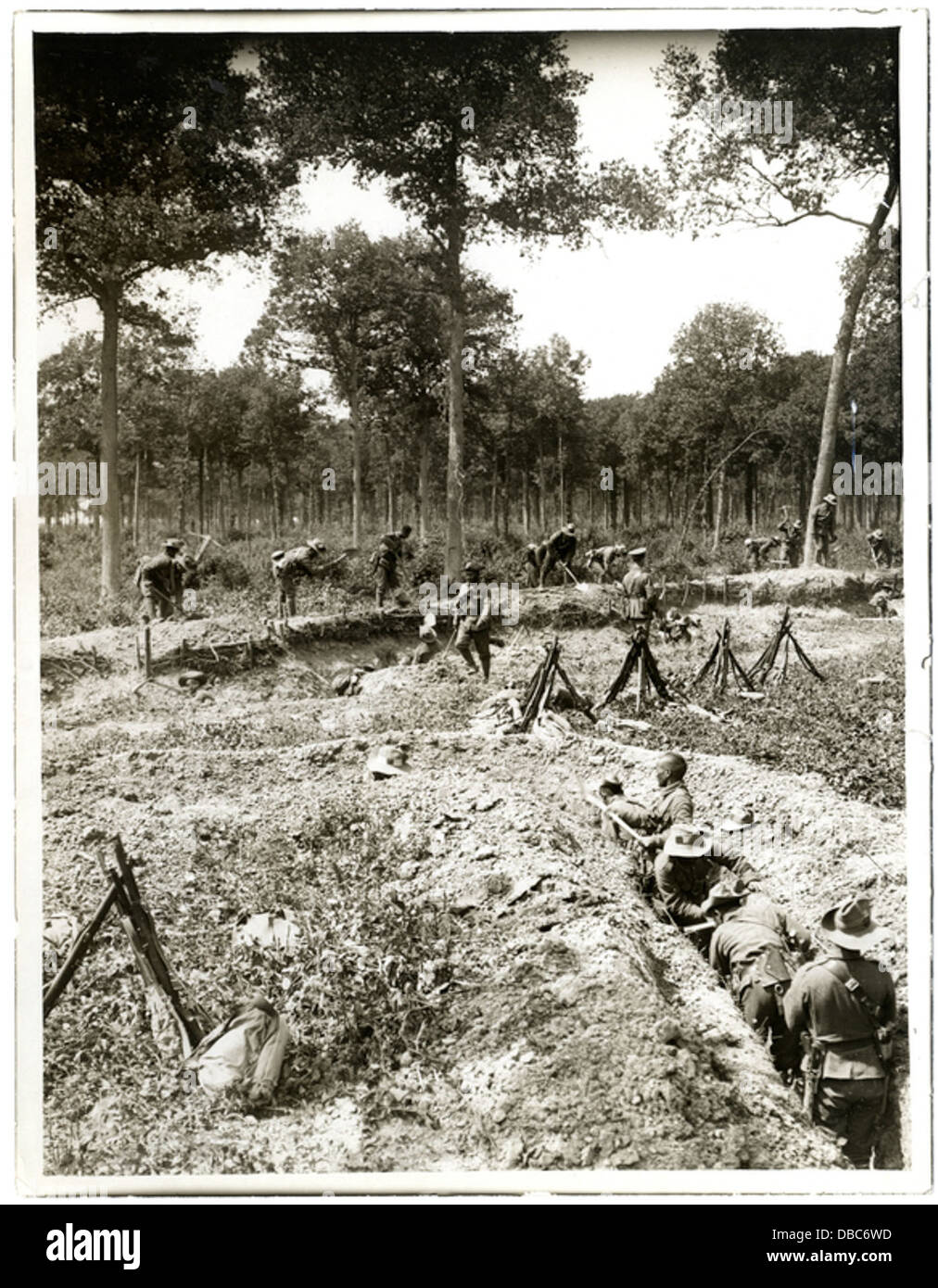 An image showing Gurkhas working on a fire trench and a communication ...