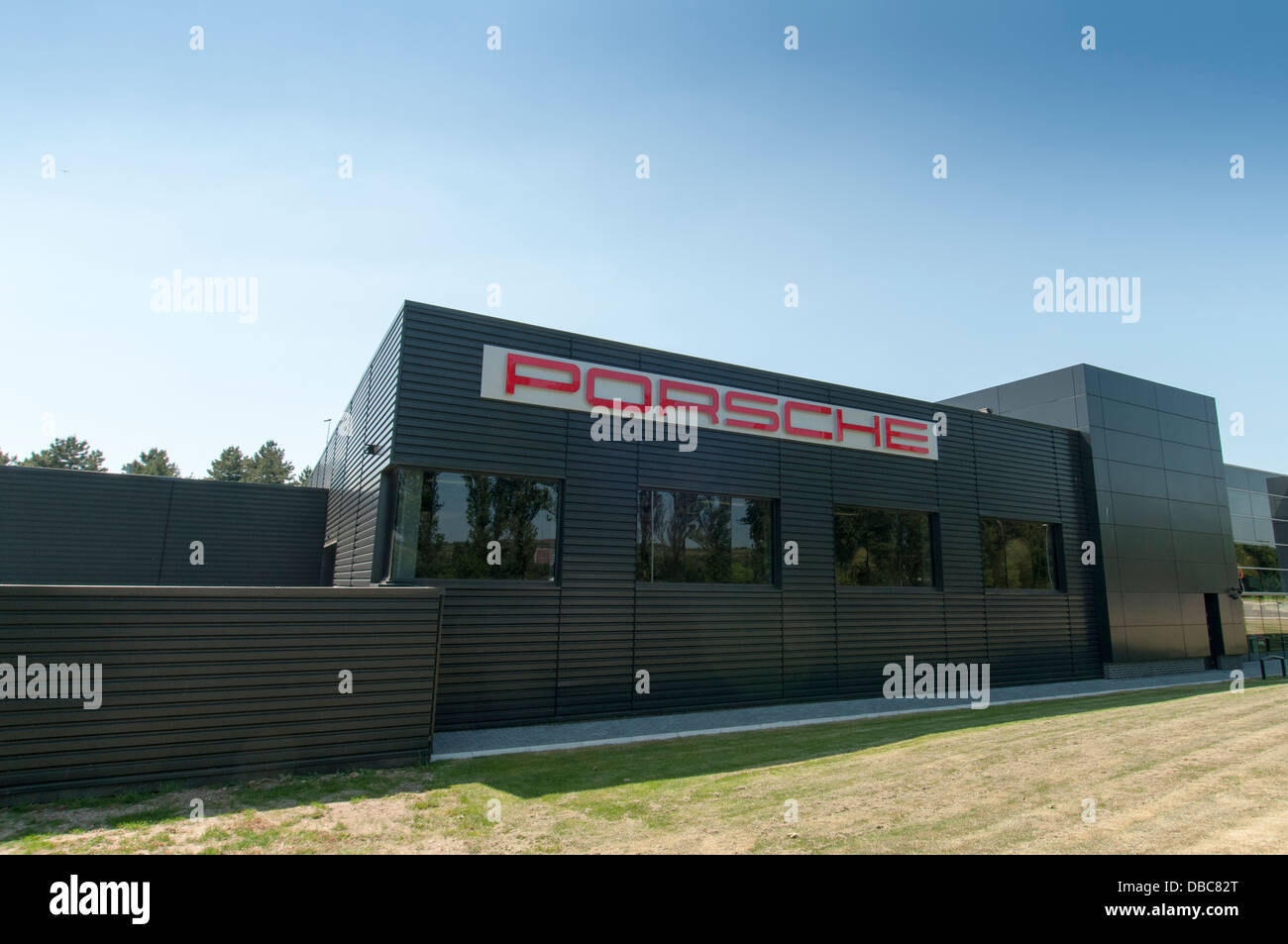 Porsche Garage dealership Stock Photo - Alamy
