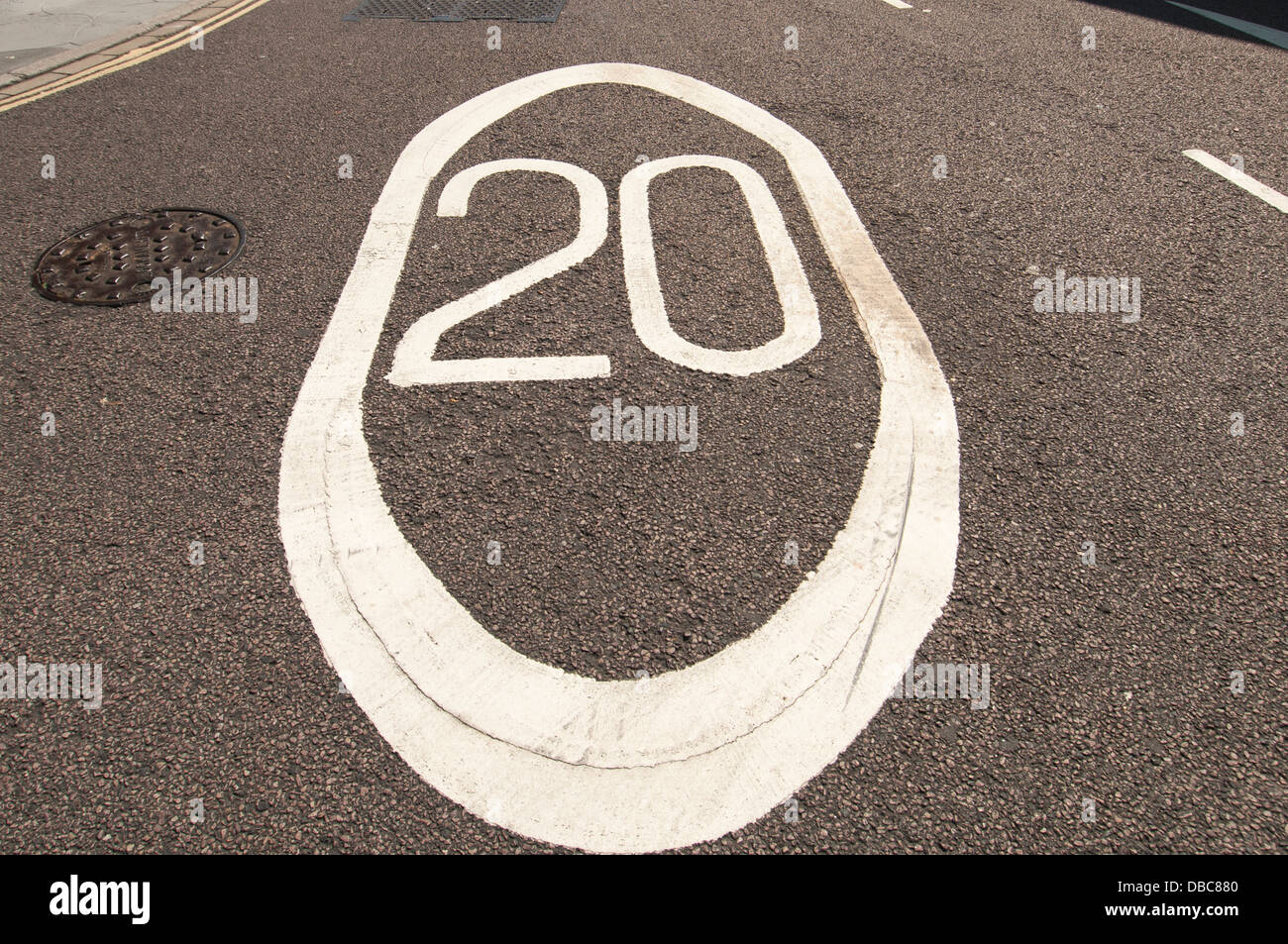 20 mph road marking Stock Photo - Alamy