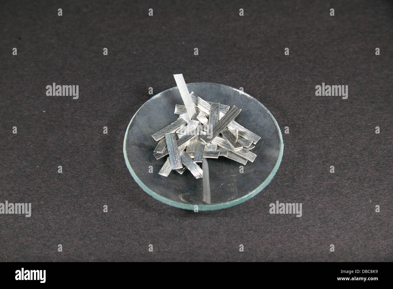 Small strips of the metal magnesium (Mg) as used in a UK high school ...