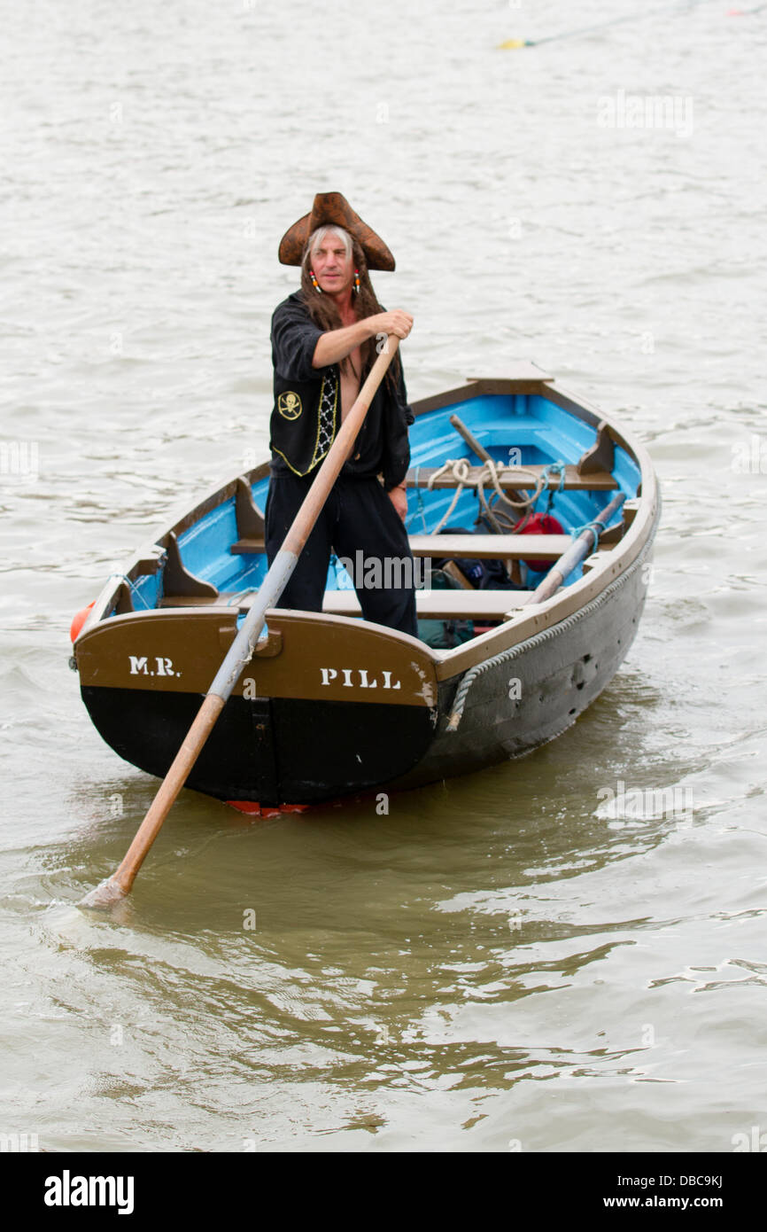Bristol, UK. 27th July, 2013. Mr Pill the pirate pilots his boat Credit ...