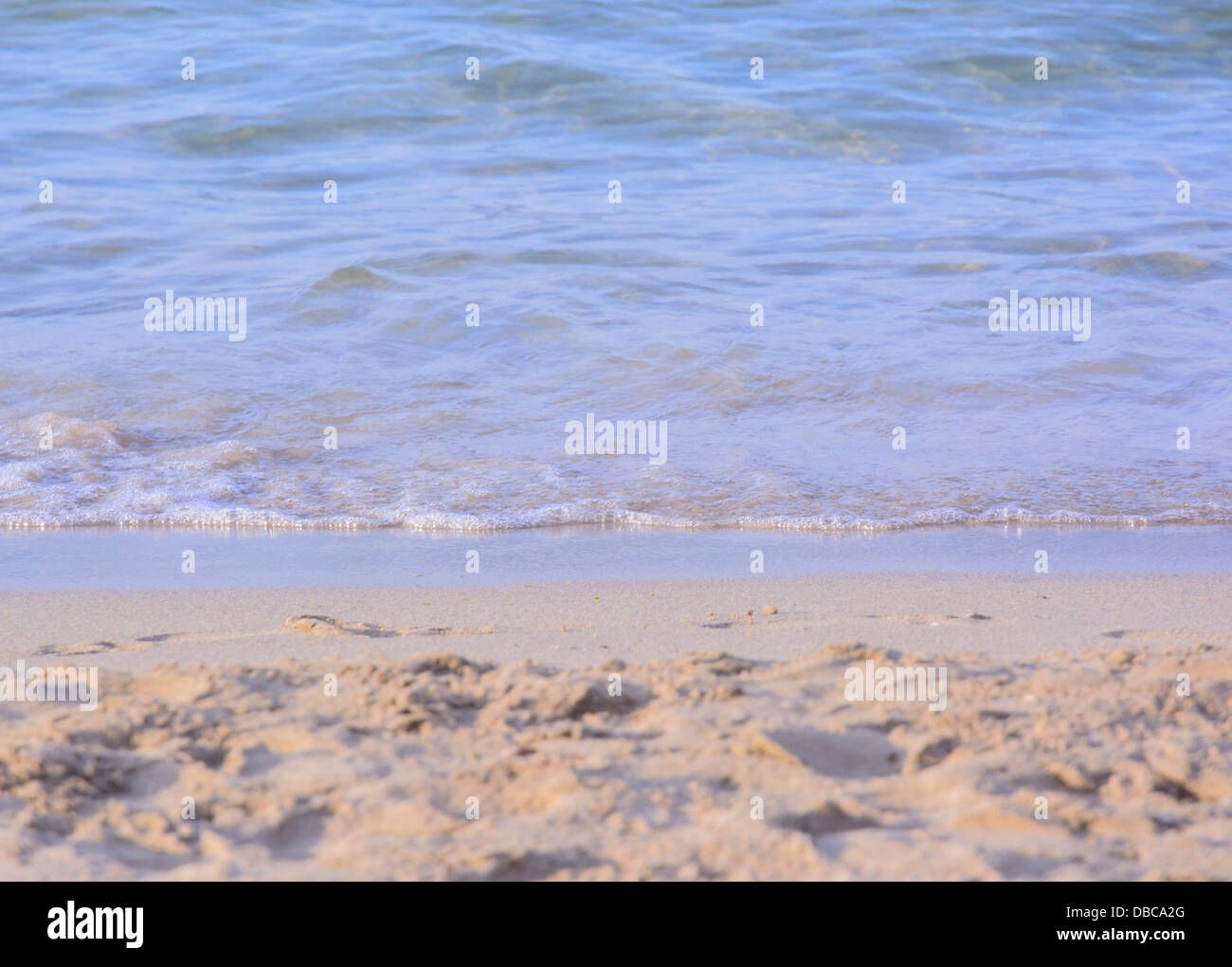 Closeup of sandy beach in dreamy color hue Stock Photo - Alamy