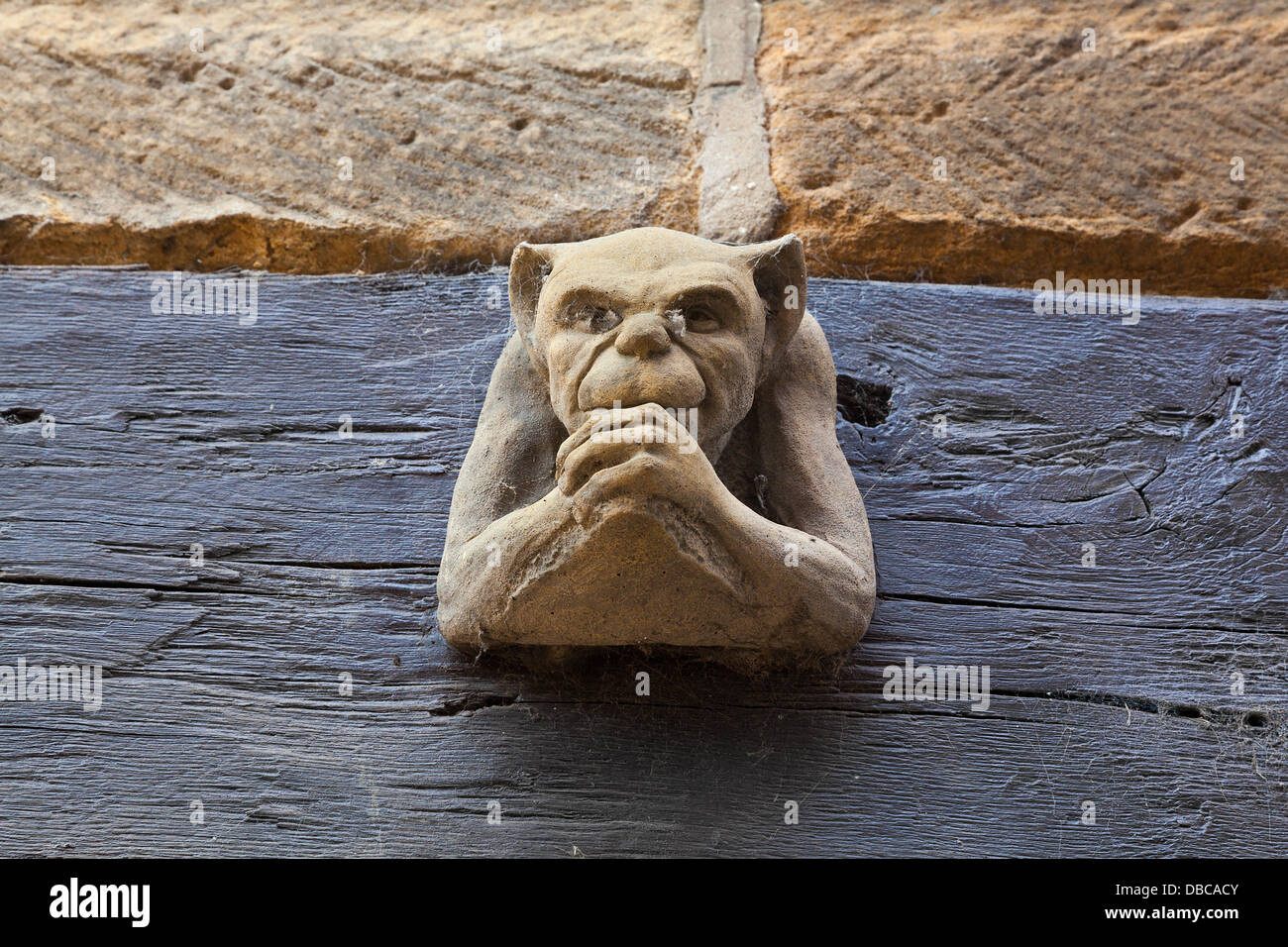 Gargoyle mounted on an exterior wall Stock Photo - Alamy