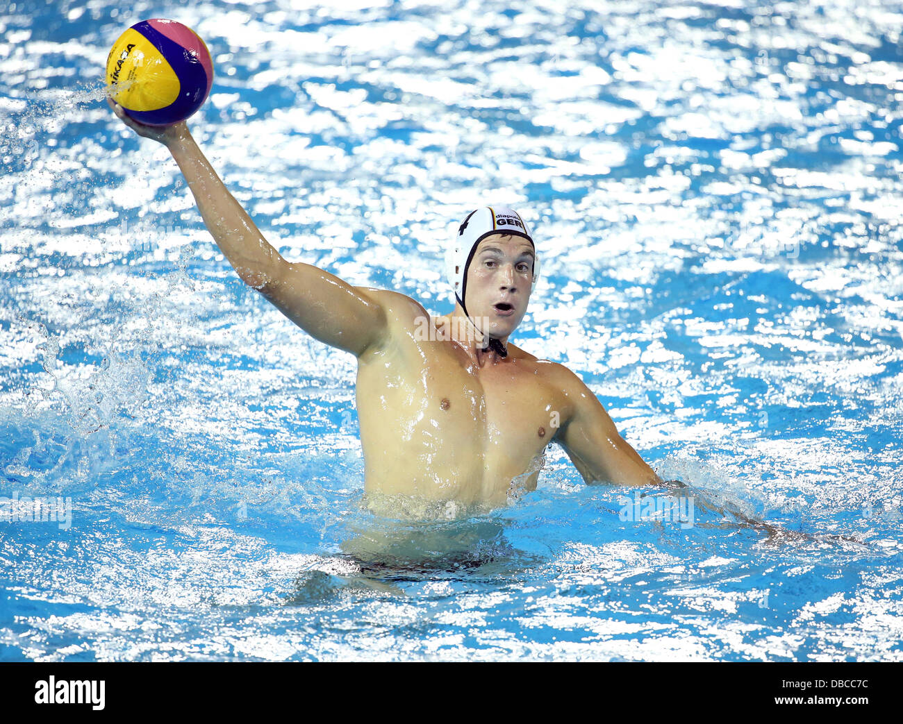 Julian Real of Germany controls the ball during their Men's water polo ...