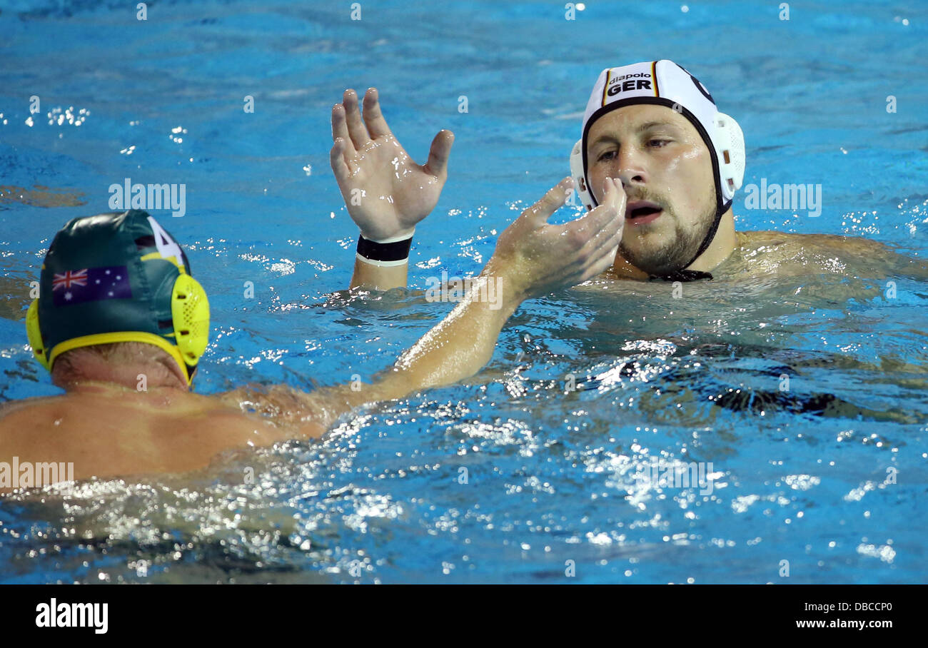 Paul Schüler (R) of Germany and John Cotterill of Australia shake hands after their Men's water ...