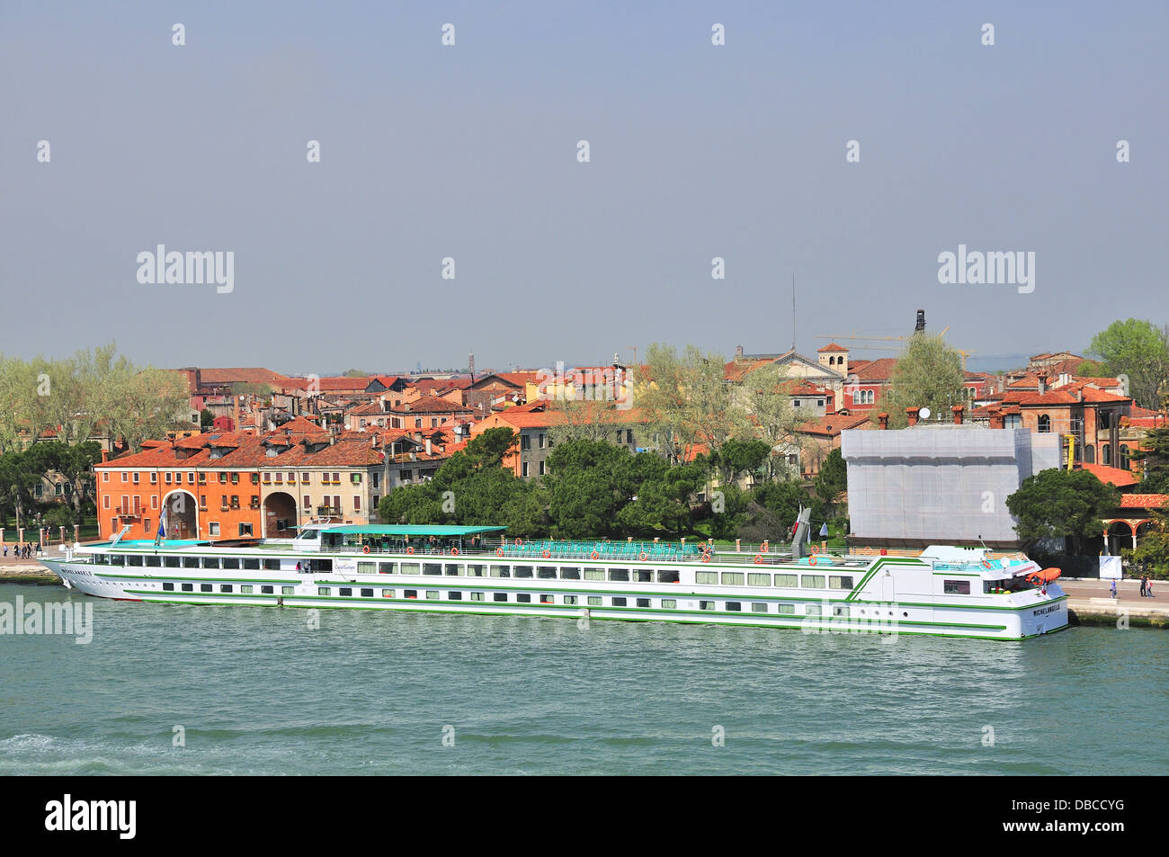 Large river cruising passenger ferry docked in the famous city of ...