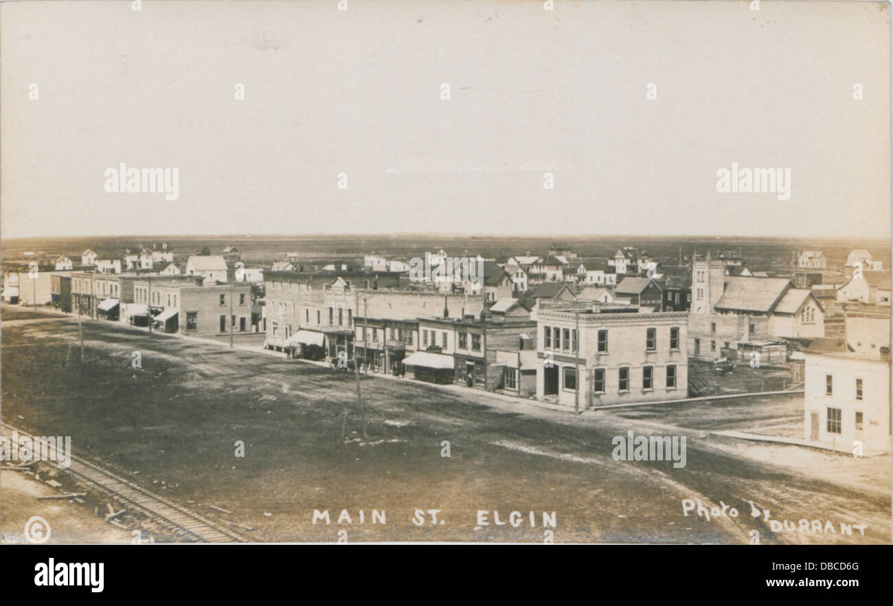 This image shows a street view of Main Street in Elgin, capturing the ...