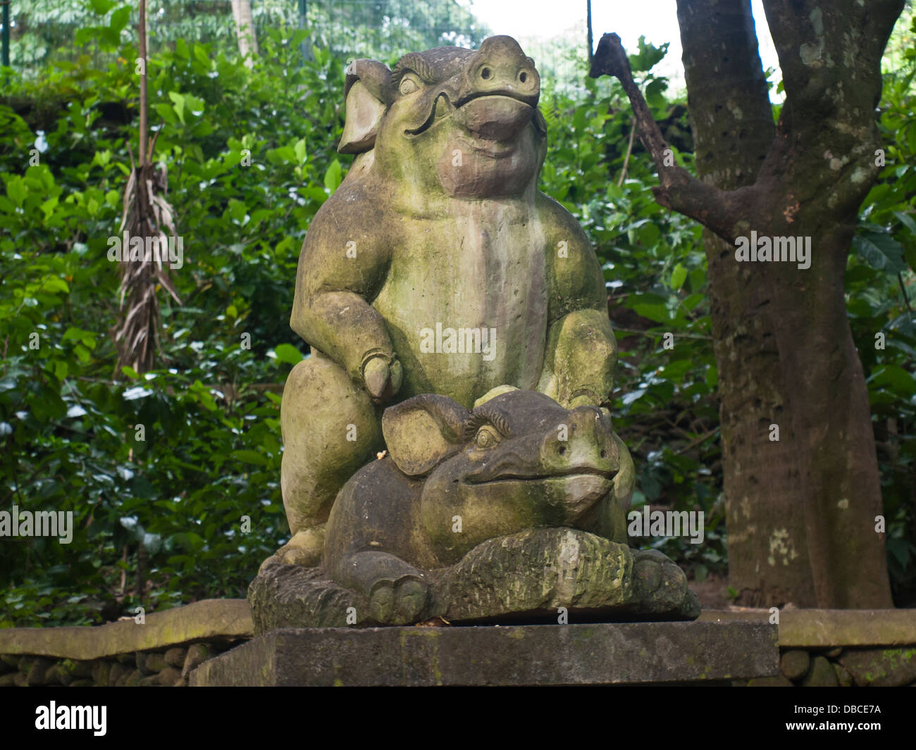 Monkey forest pigs sculpture, Ubud Stock Photo - Alamy
