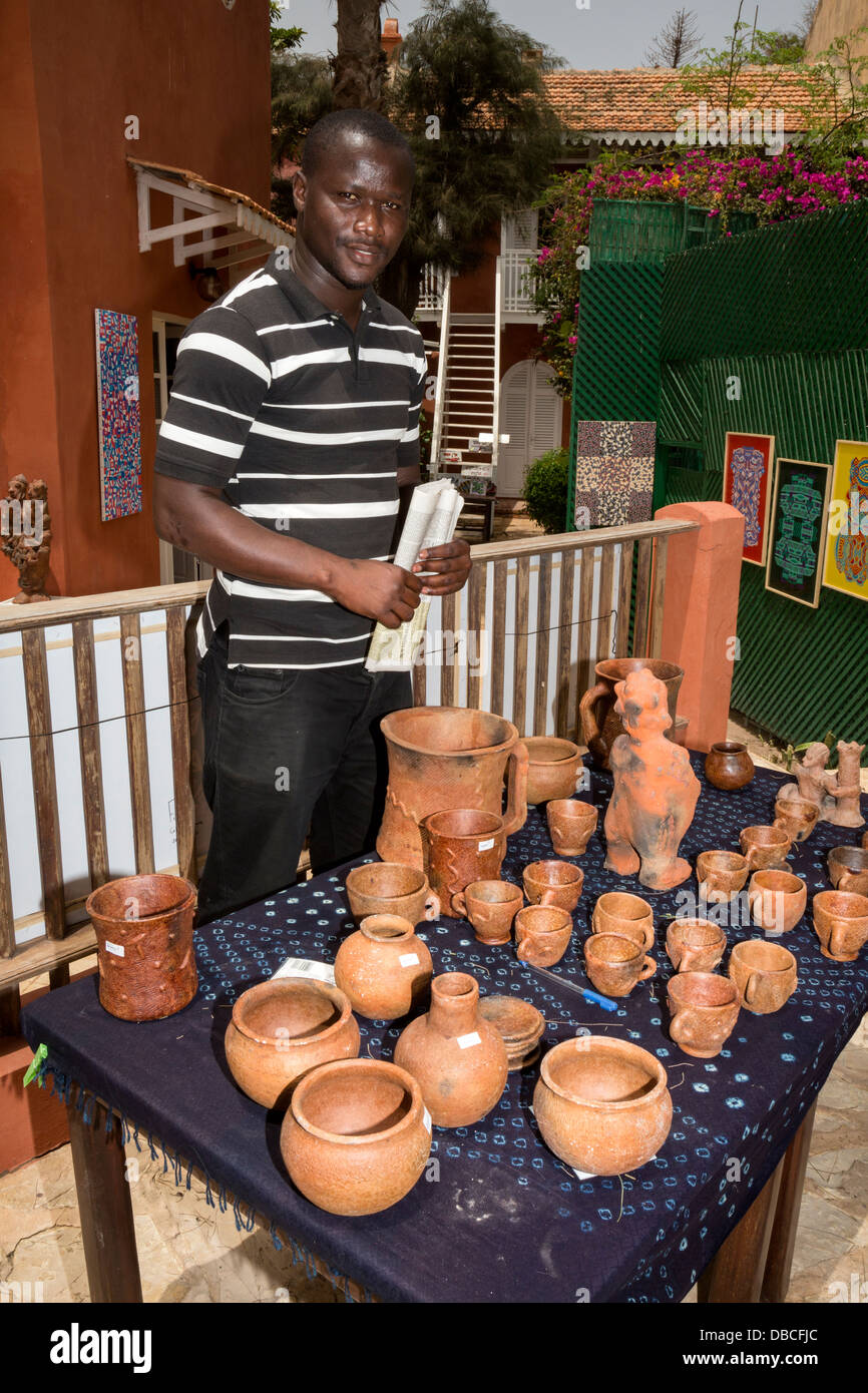 Dominique Diatta, from Casamance, Displaying his Mother's Pottery ...