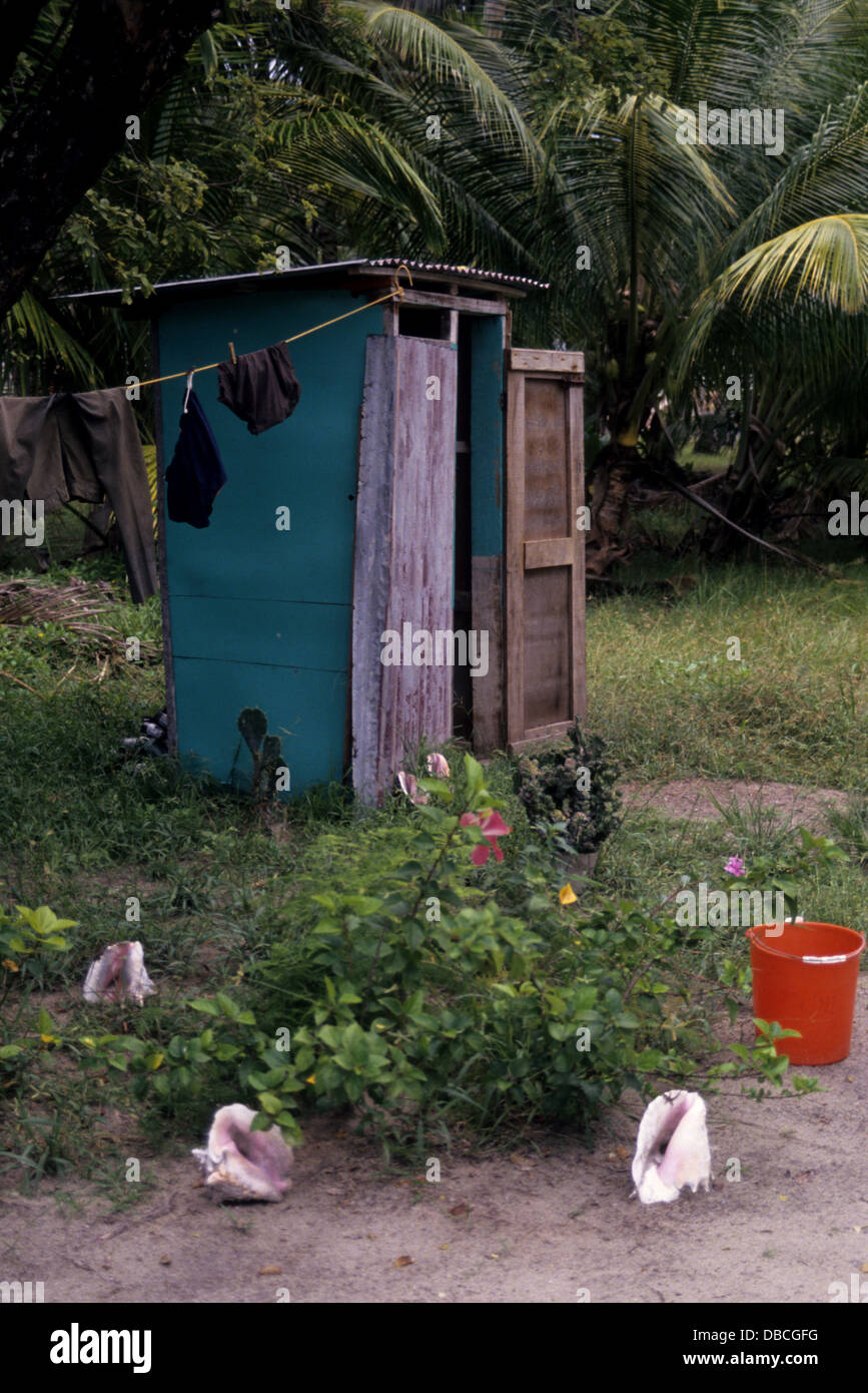 Outhouse decorated with conch shells at Caye Caulker Belize Stock Photo ...