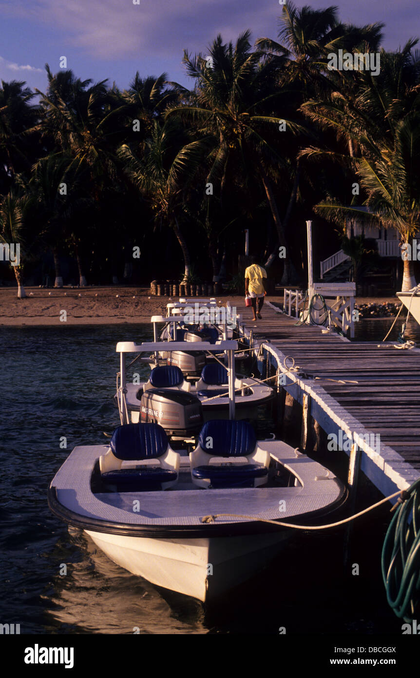 Bonefishing skiffs lined up at the dock at Turneffe Flats Lodge Belize ...