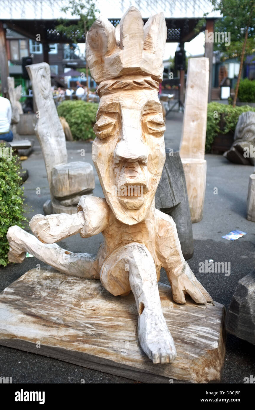 Wood carved statue art Stock Photo - Alamy