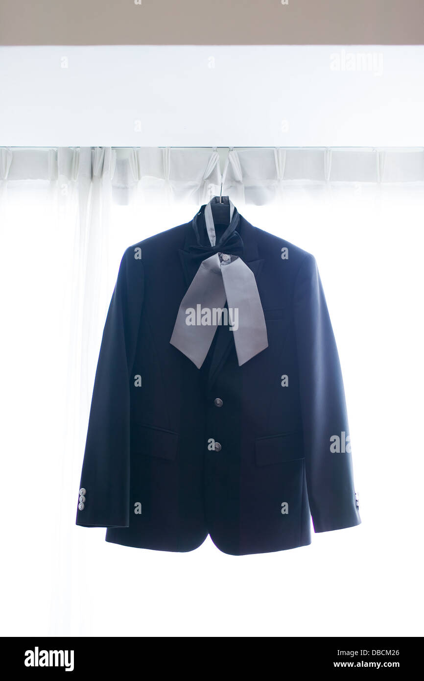 Hanging groom suit hi-res stock photography and images - Alamy
