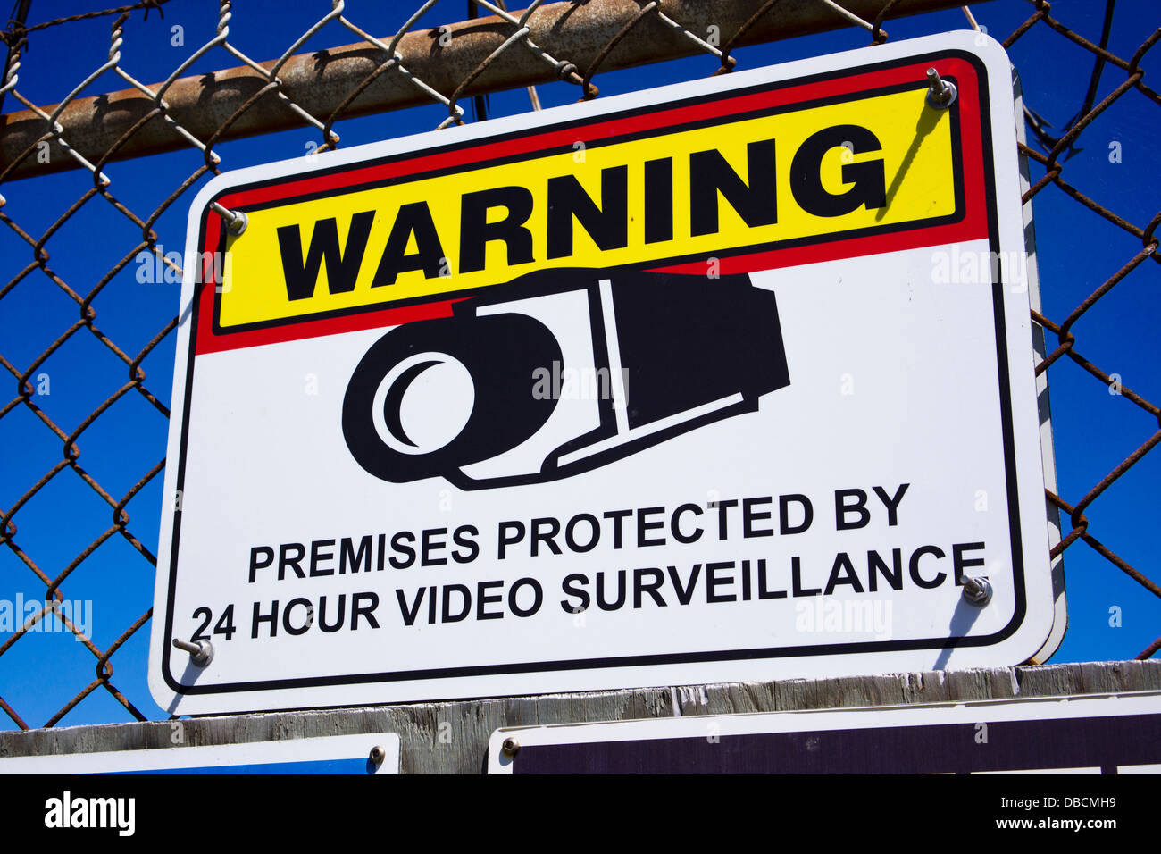 24 hour video surveillance warning sign Stock Photo - Alamy