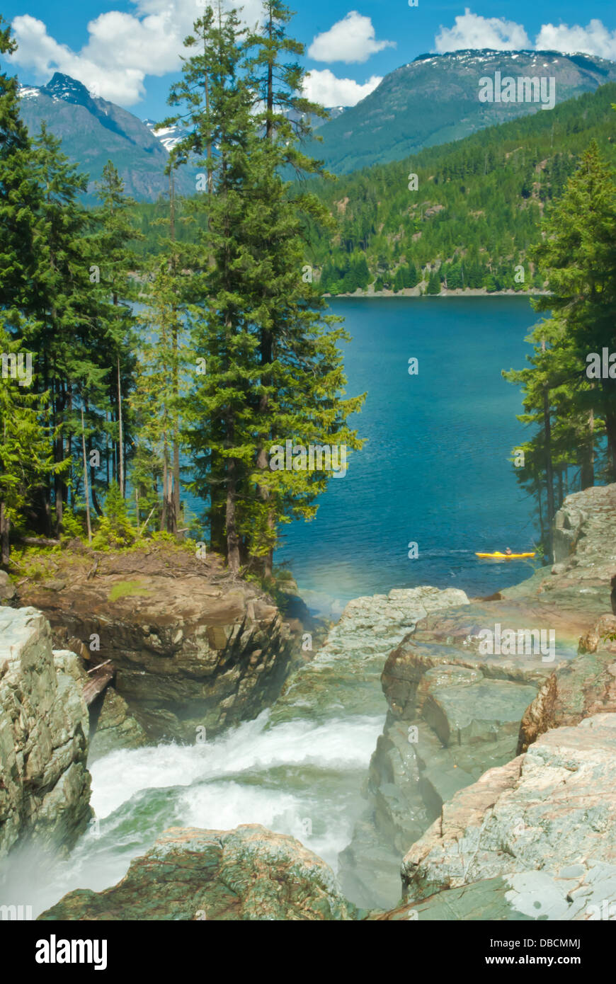 Lower Myra falls flowing into Buttle Lake with yellow kayak and ...